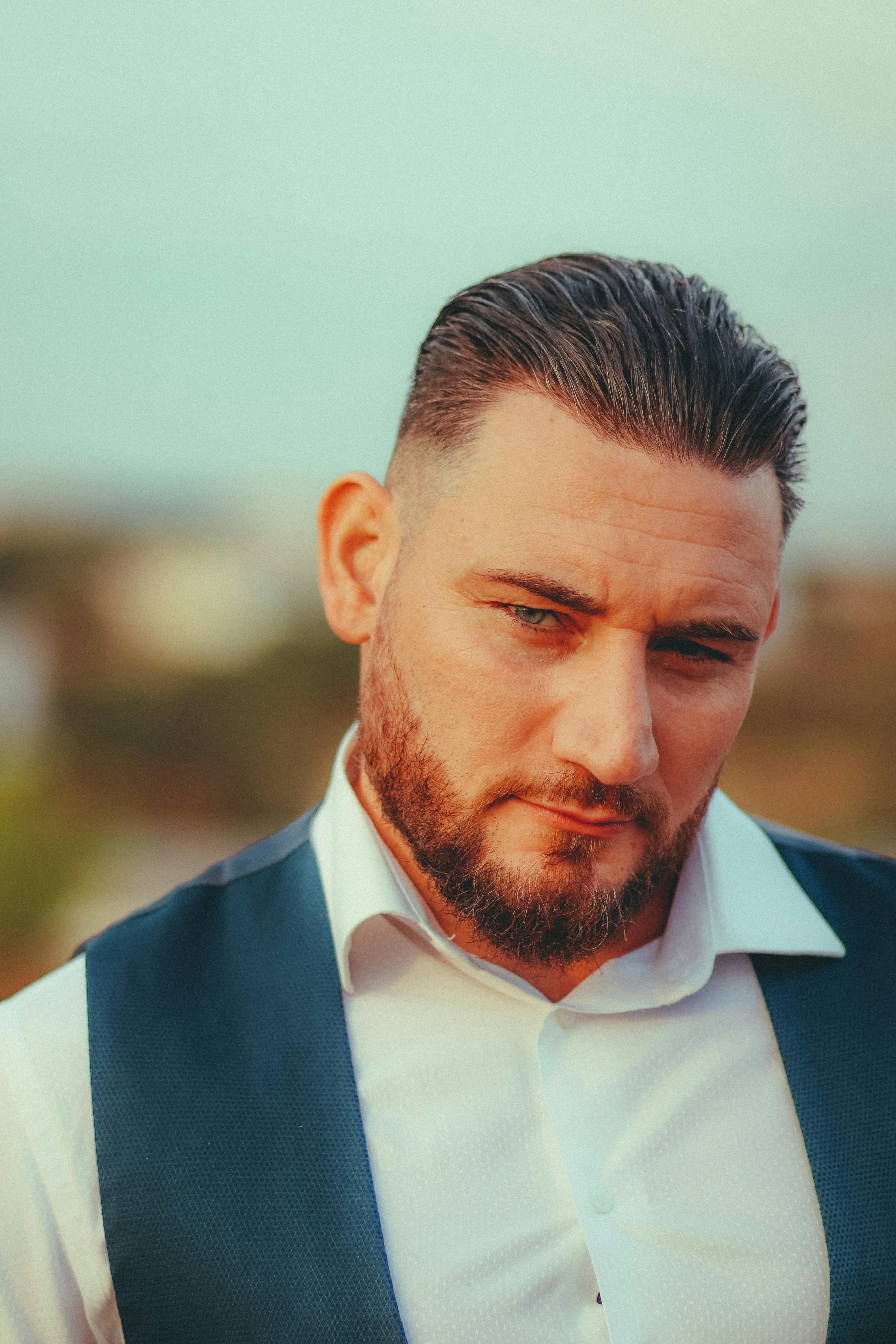 Close-up of a Good Looking Man with a Beard · Free Stock Photo
