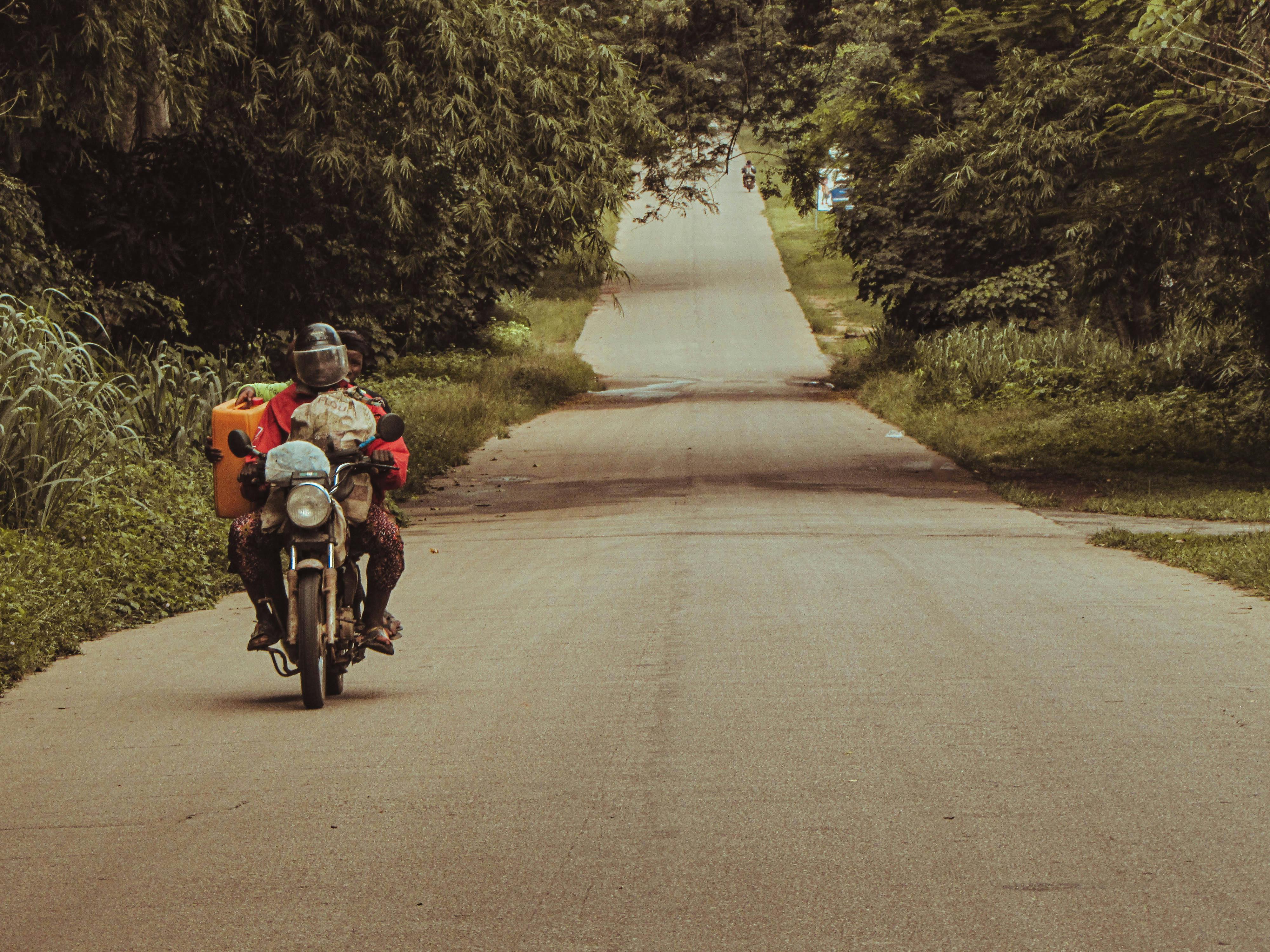 Photo of People Riding Motorcycle · Free Stock Photo