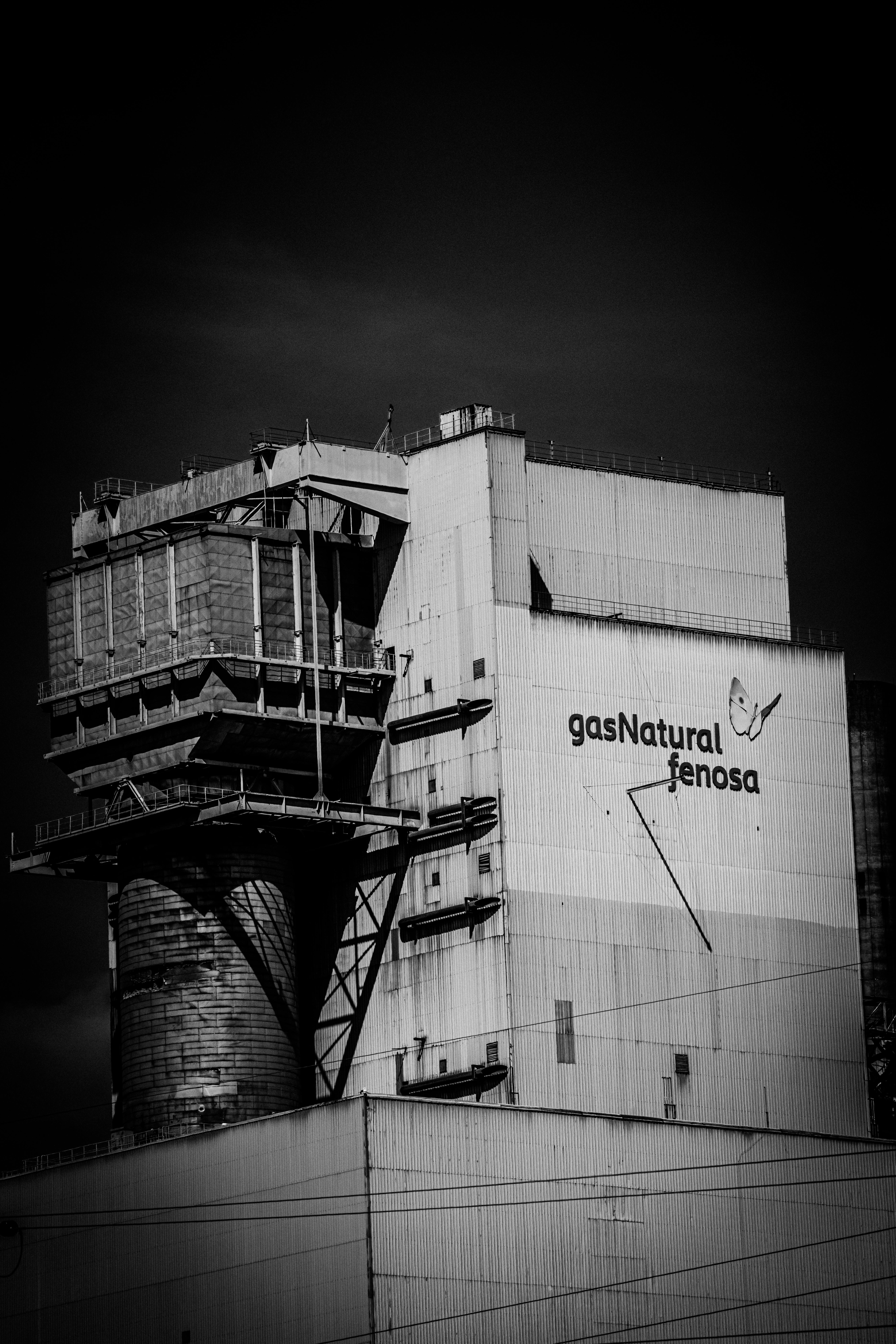 Grayscale Photo of an Abandoned Factory · Free Stock Photo