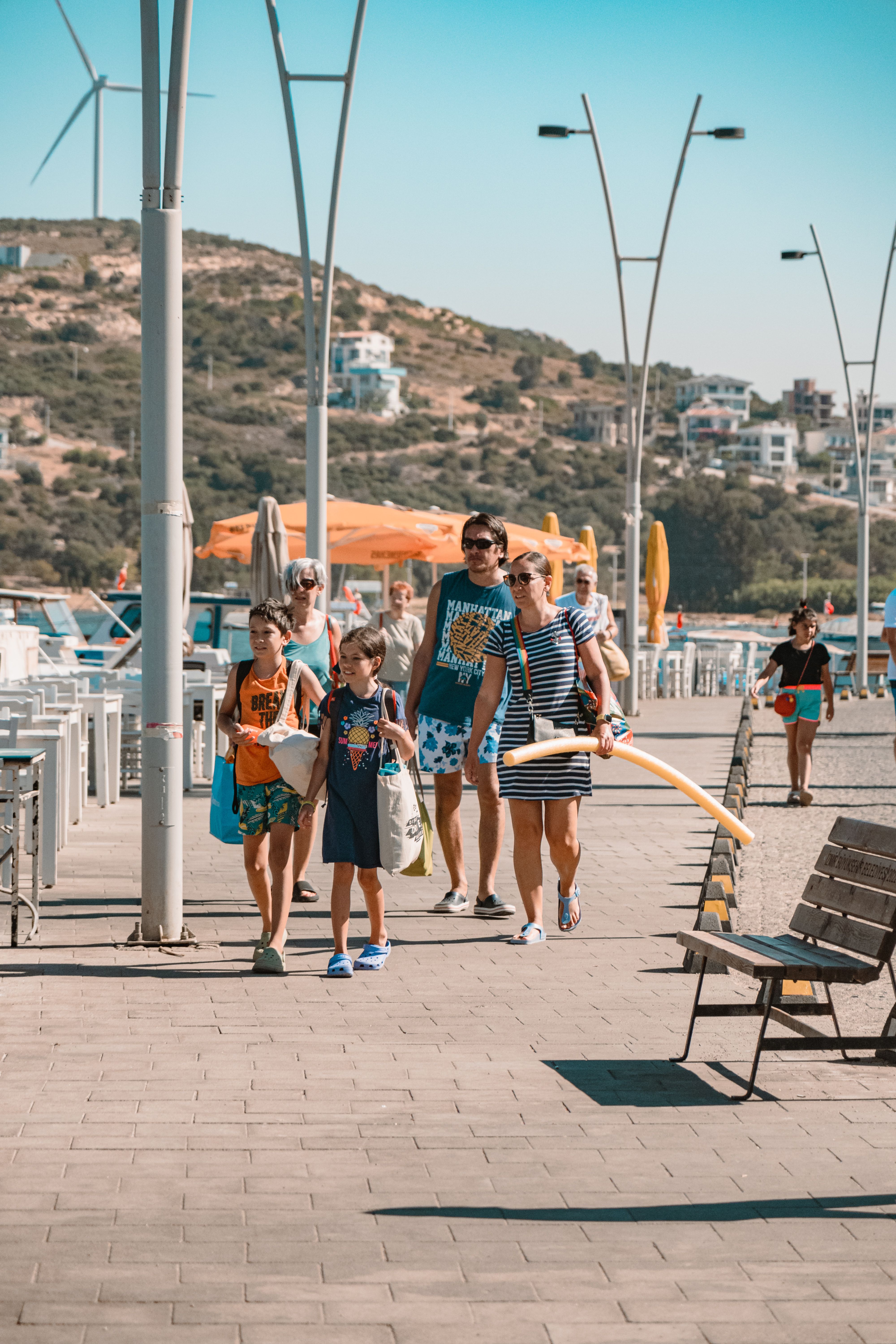 People Walking on a Seaside Street · Free Stock Photo