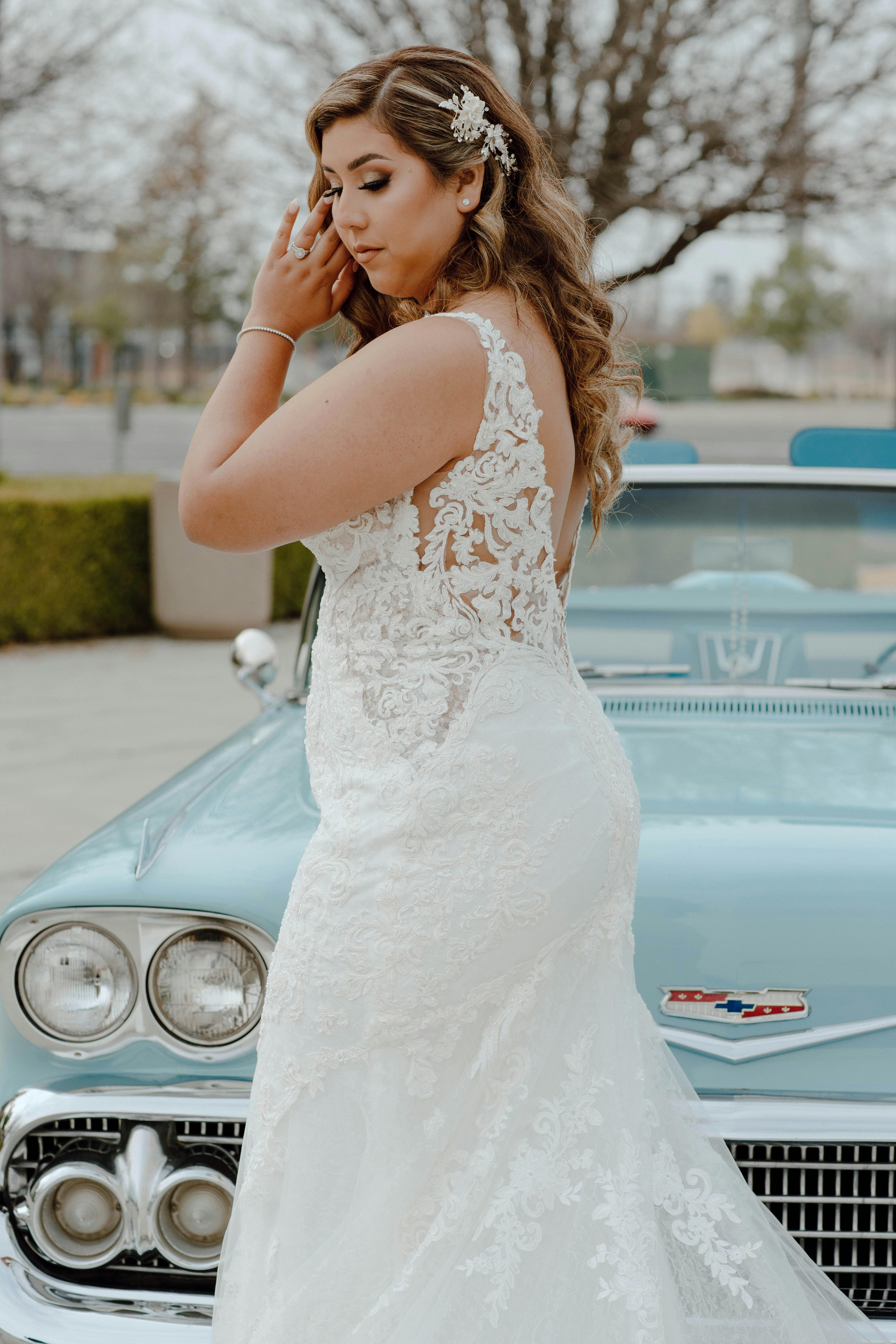 Photo of a Standing Bride in a Wedding Dress · Free Stock Photo