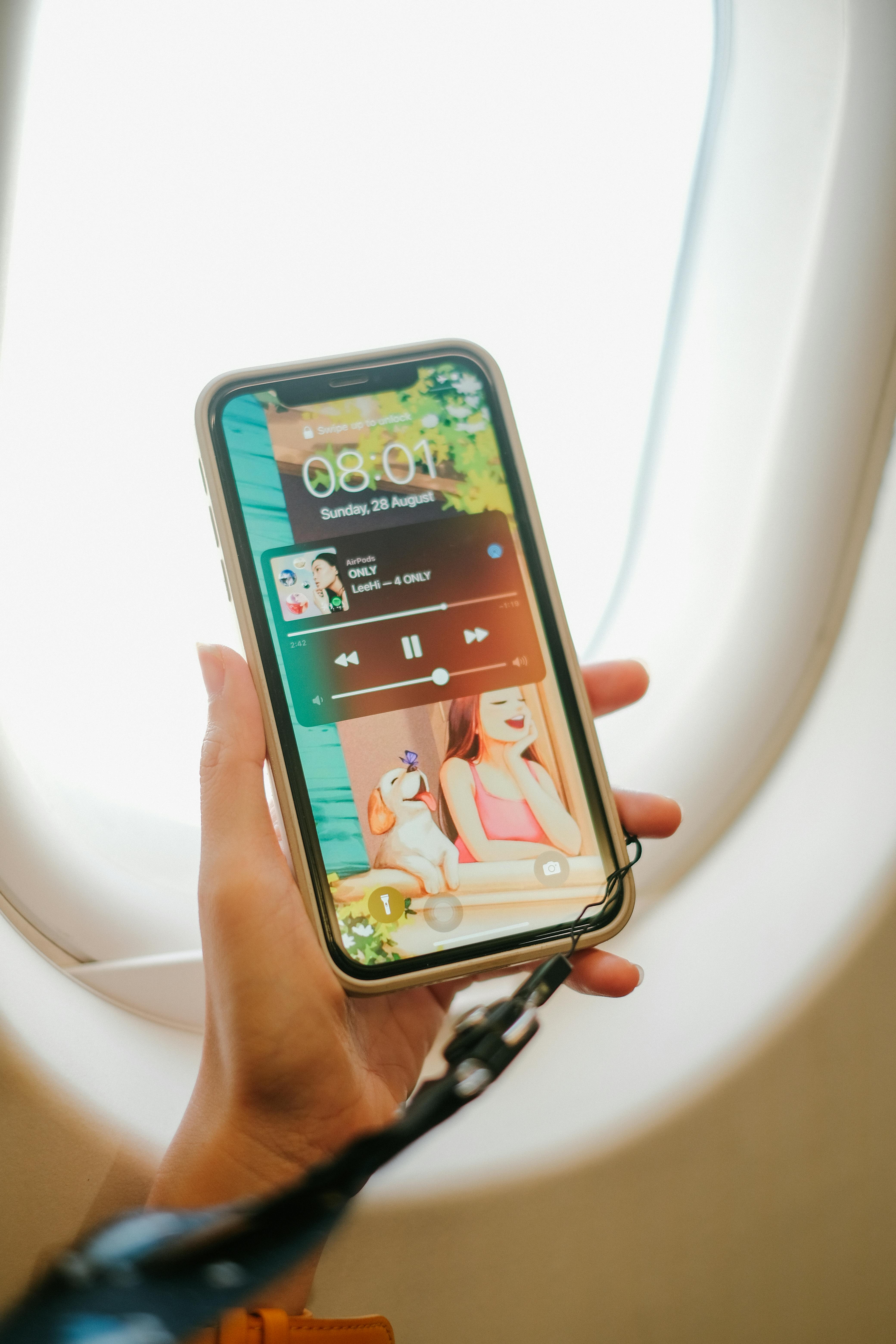 Person Holding a Smartphone · Free Stock Photo