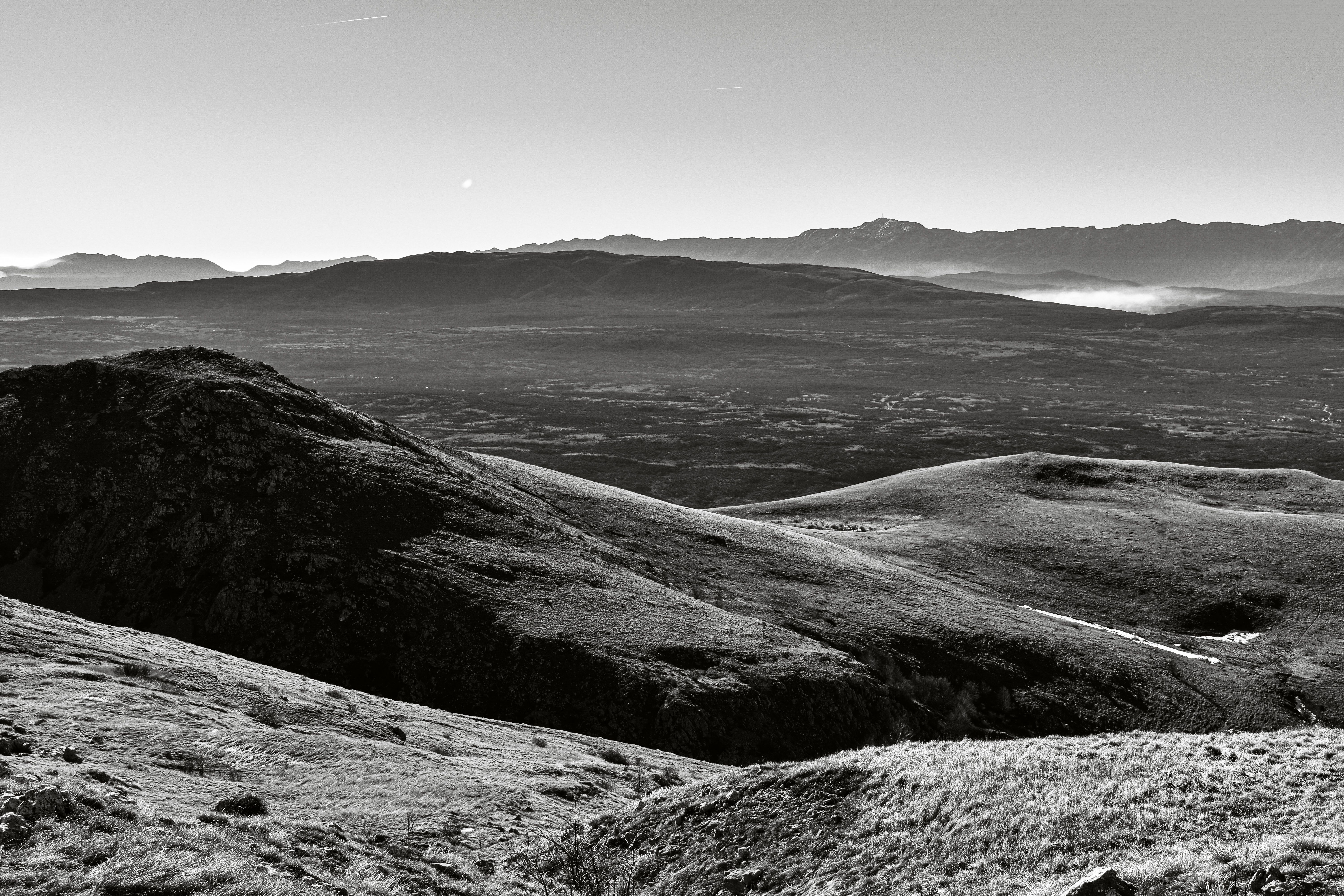 Grayscale Photo of Mountain Ranges · Free Stock Photo