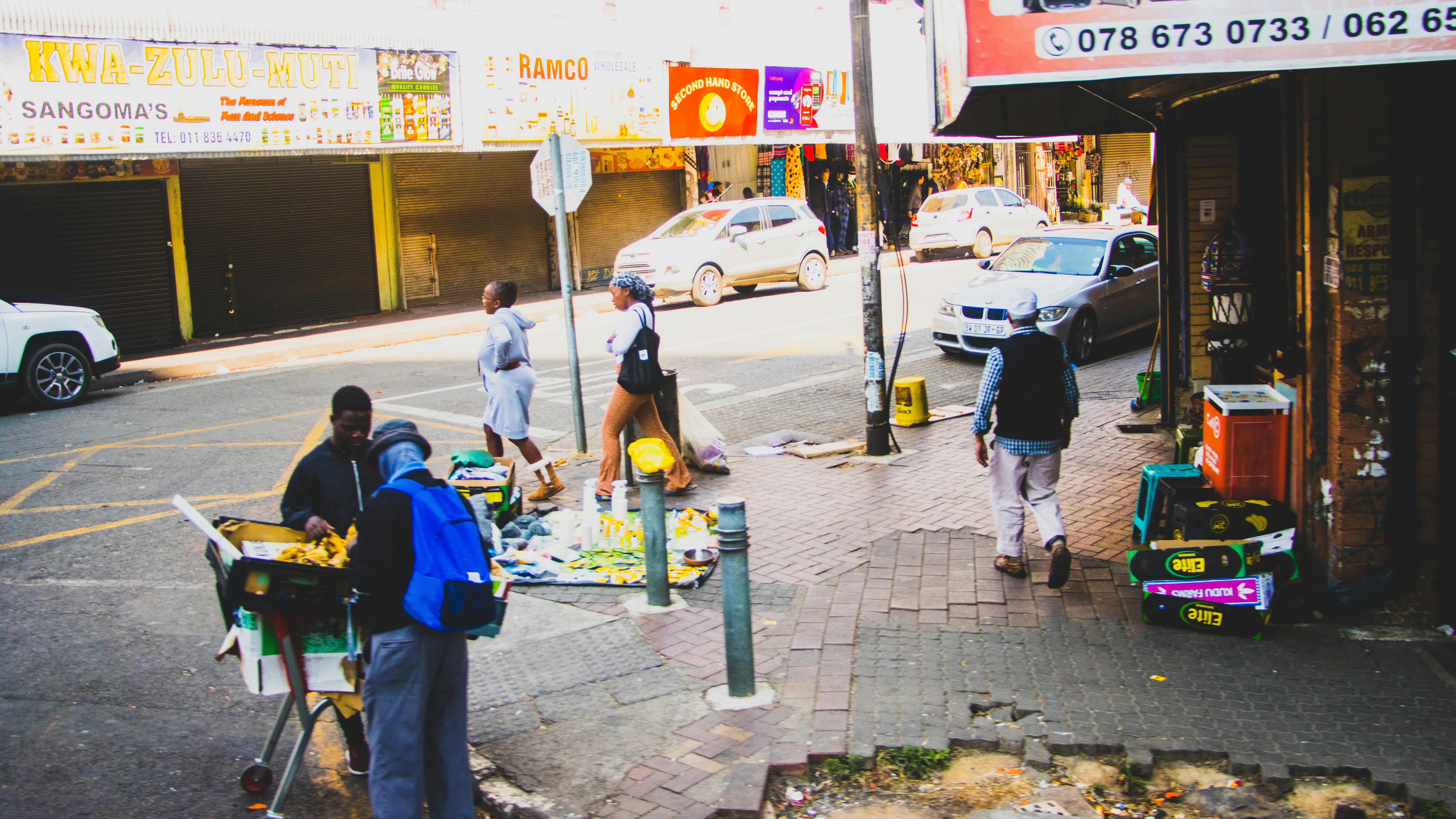 People and Cars on an Intersection in City · Free Stock Photo