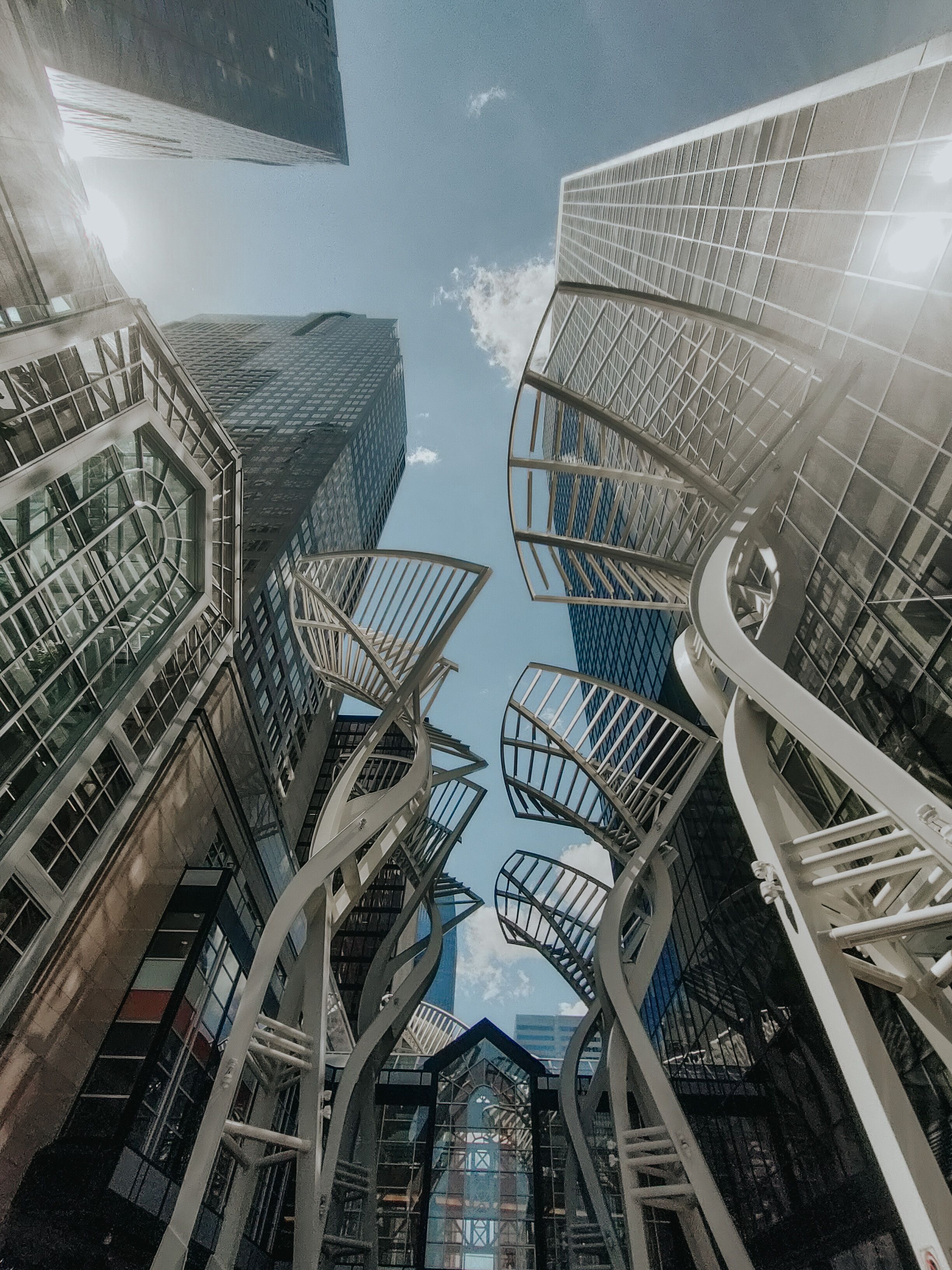 Low Angle Shot of Architectural Buildings in Downtown · Free Stock Photo
