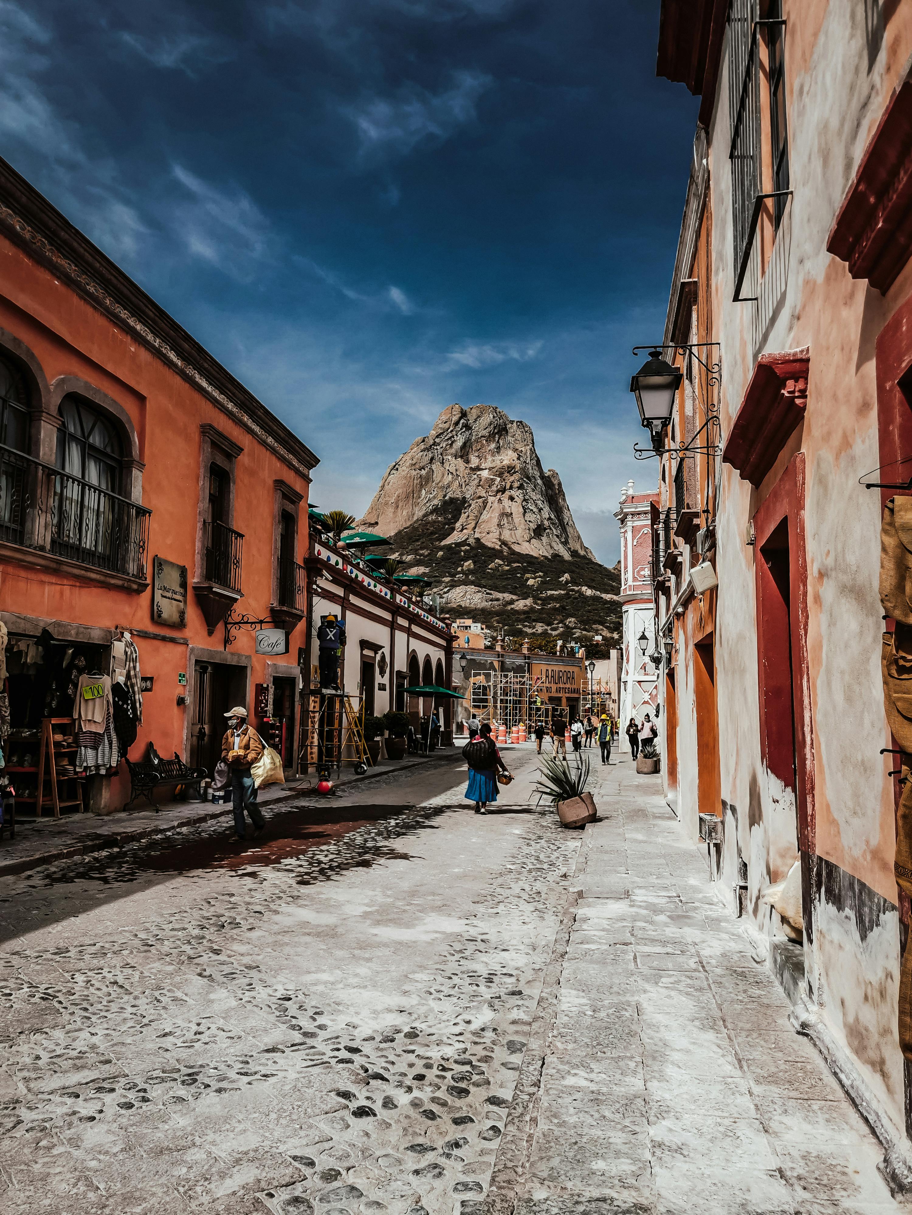 Pena de Bernal Monolith Seen from Street of Bernal · Free Stock Photo