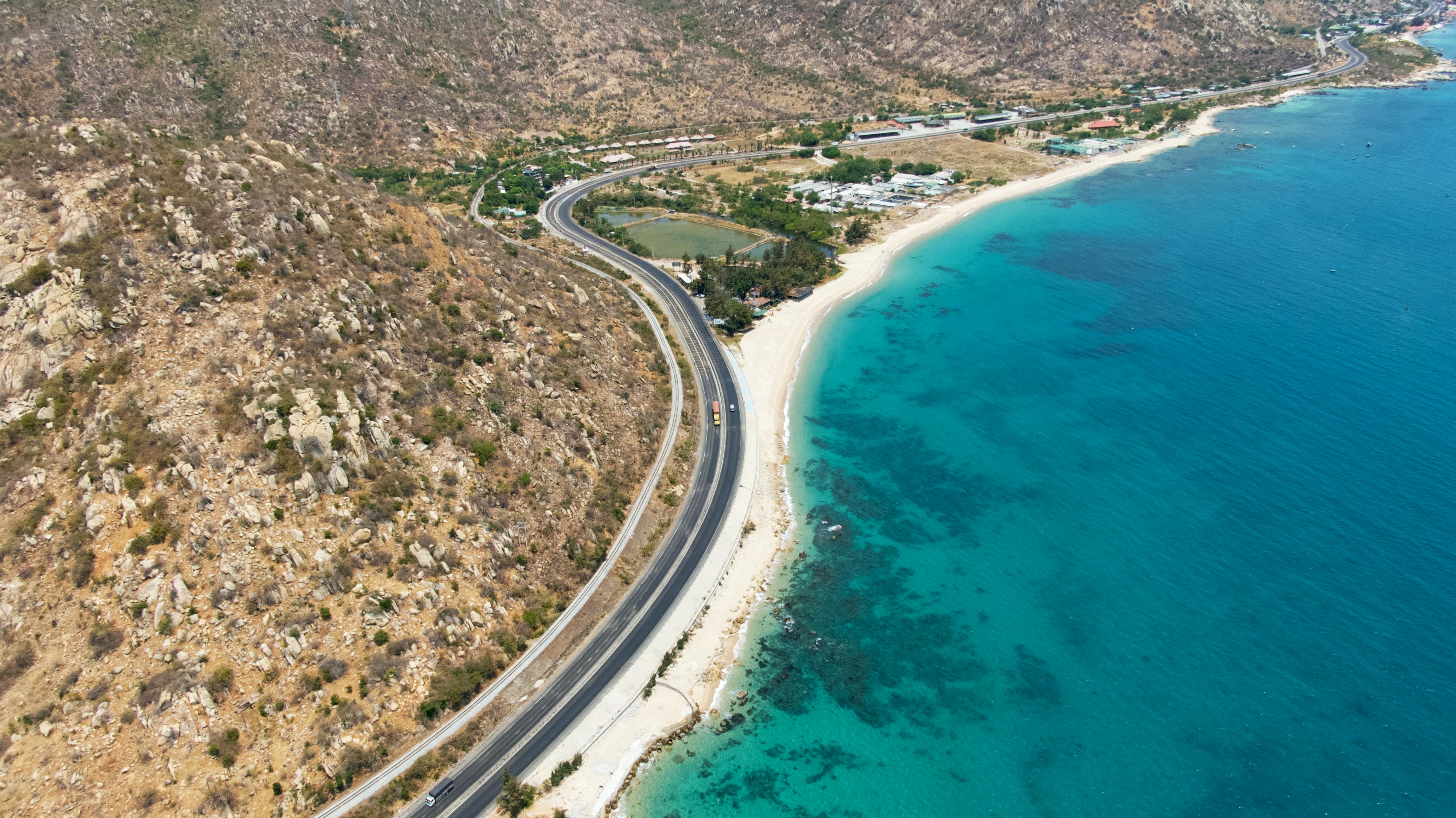 An Aerial Shot of a Highway by the Ocean · Free Stock Photo