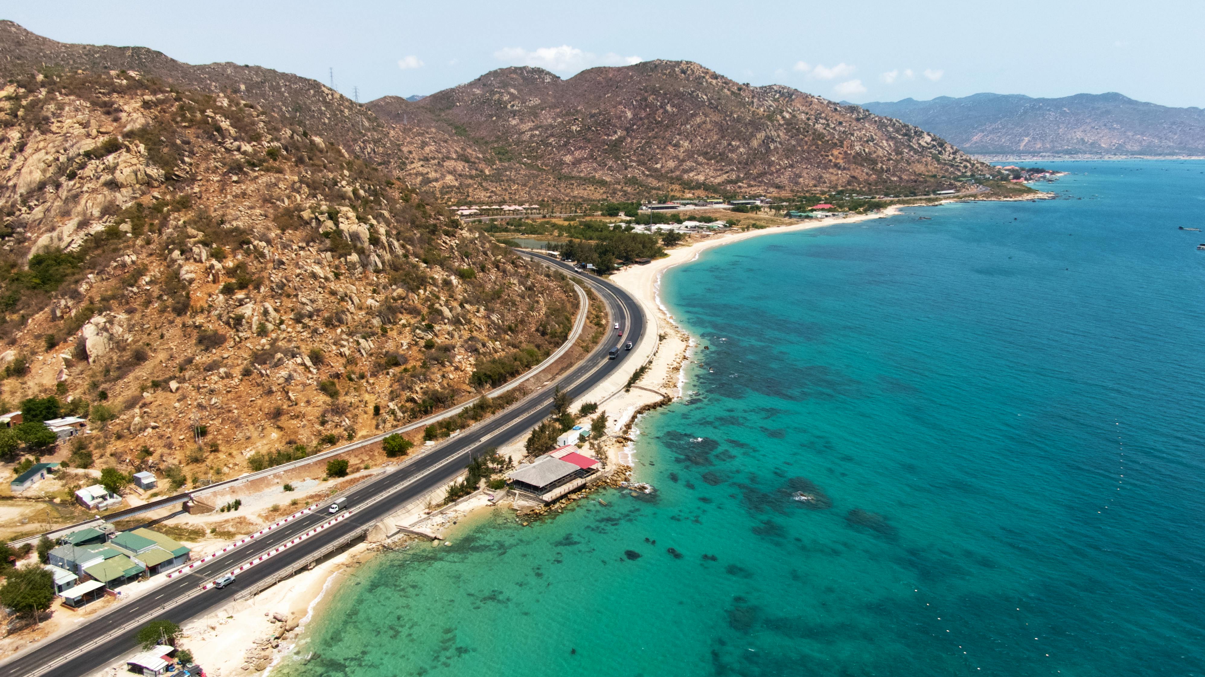 An Aerial Shot of a Highway by the Ocean · Free Stock Photo