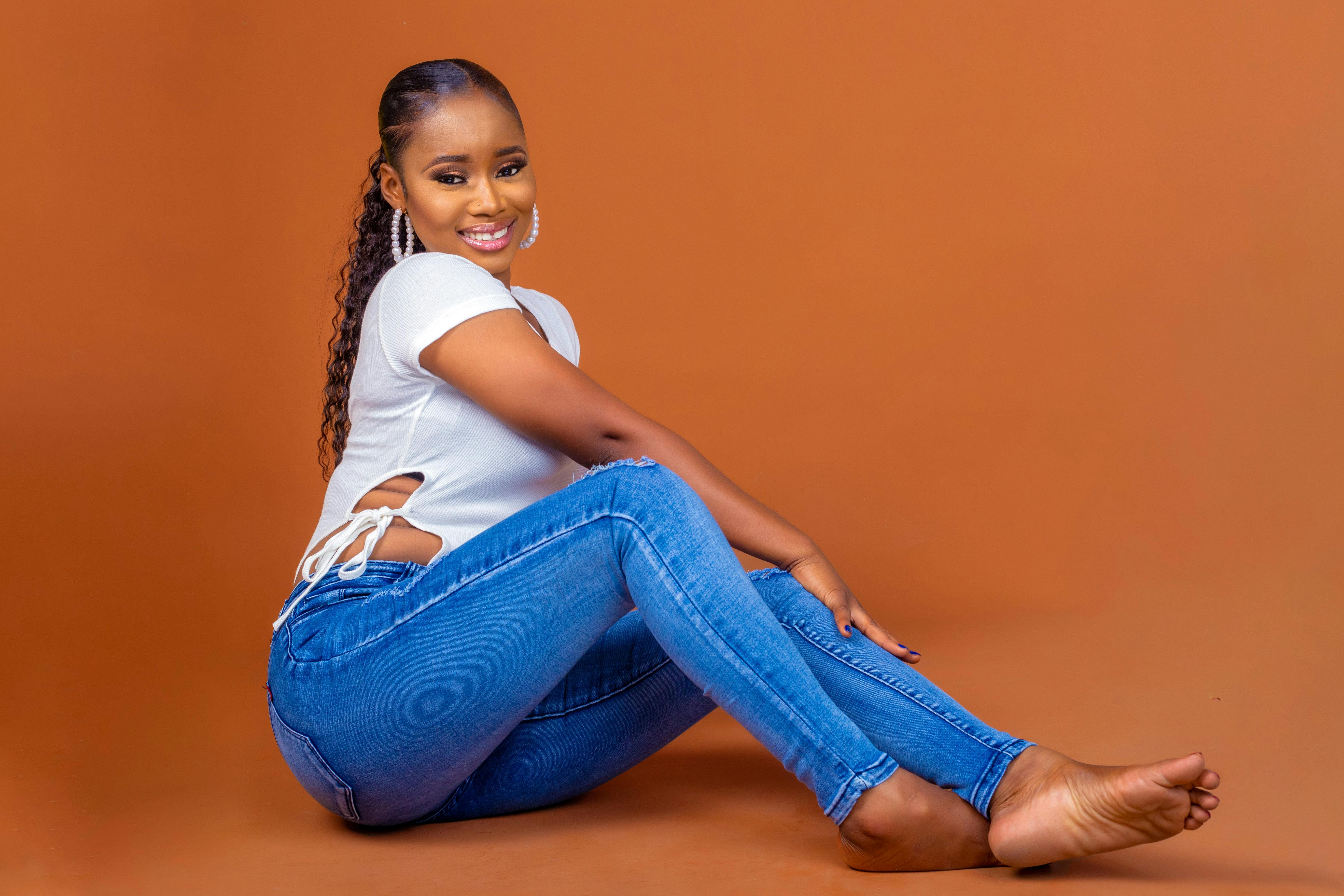 Beautiful Woman in Blue Denim Jeans · Free Stock Photo