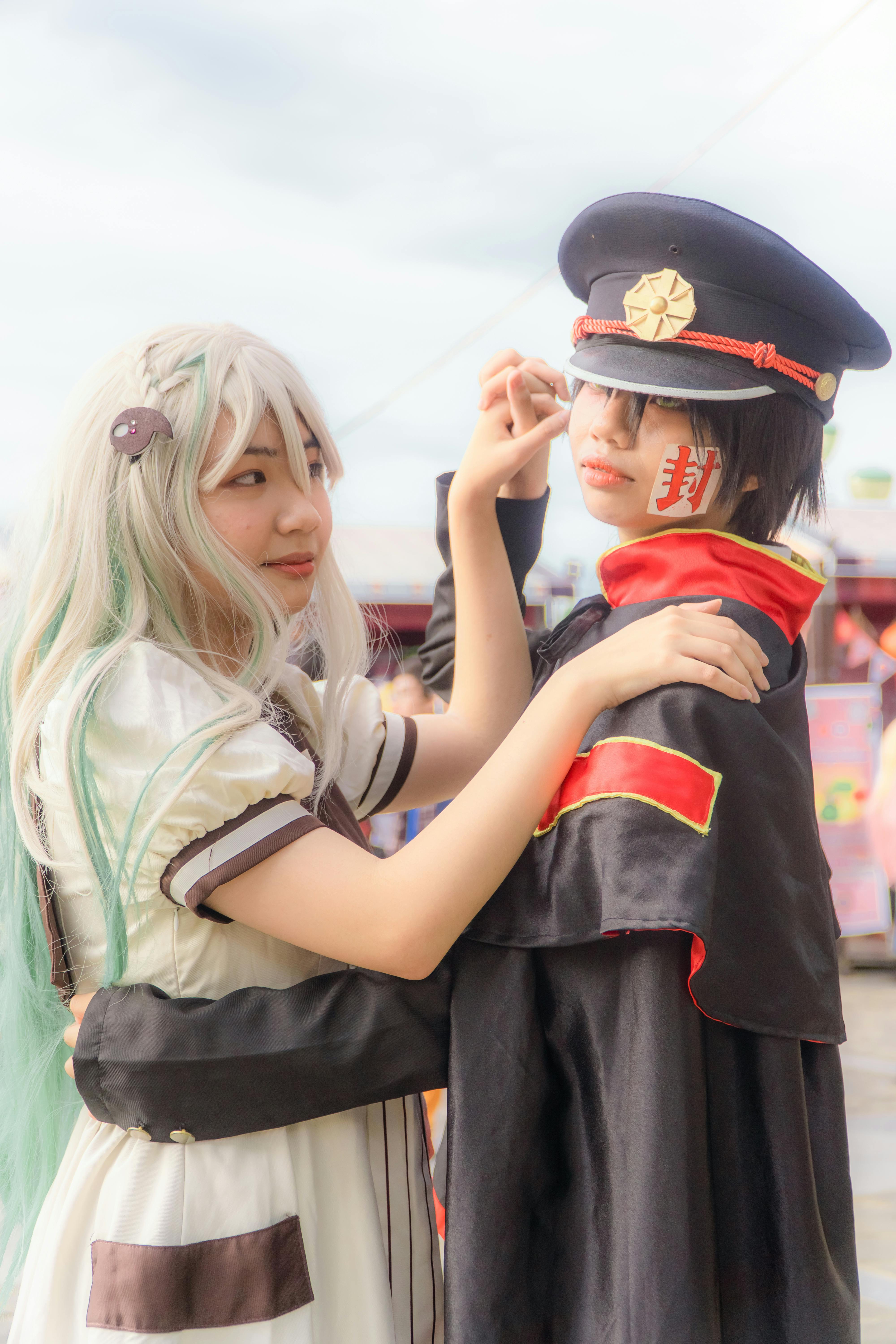 Two Cosplayers Wearing Their Costumes · Free Stock Photo