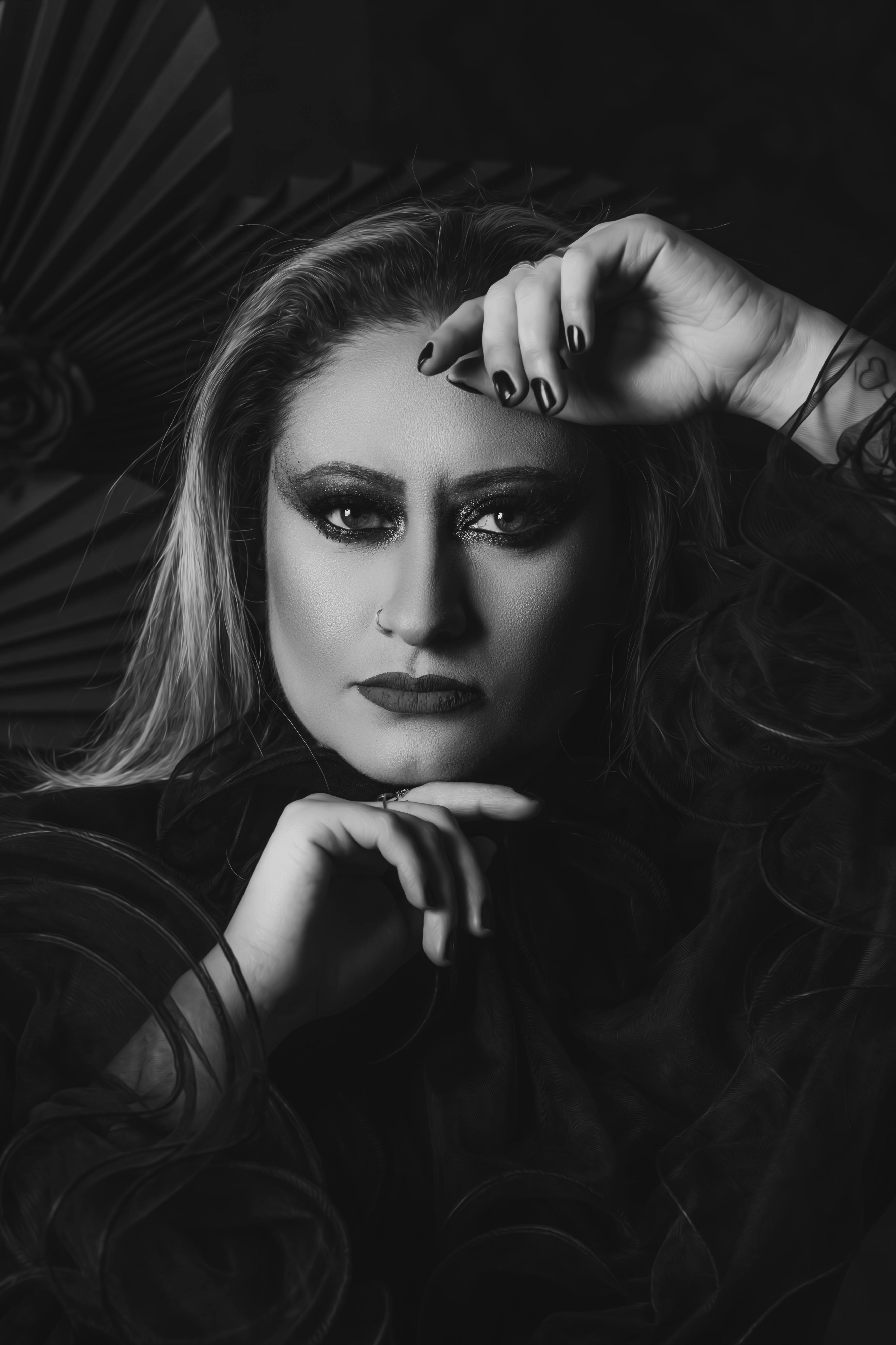 Portrait of Woman with Hands around Face · Free Stock Photo