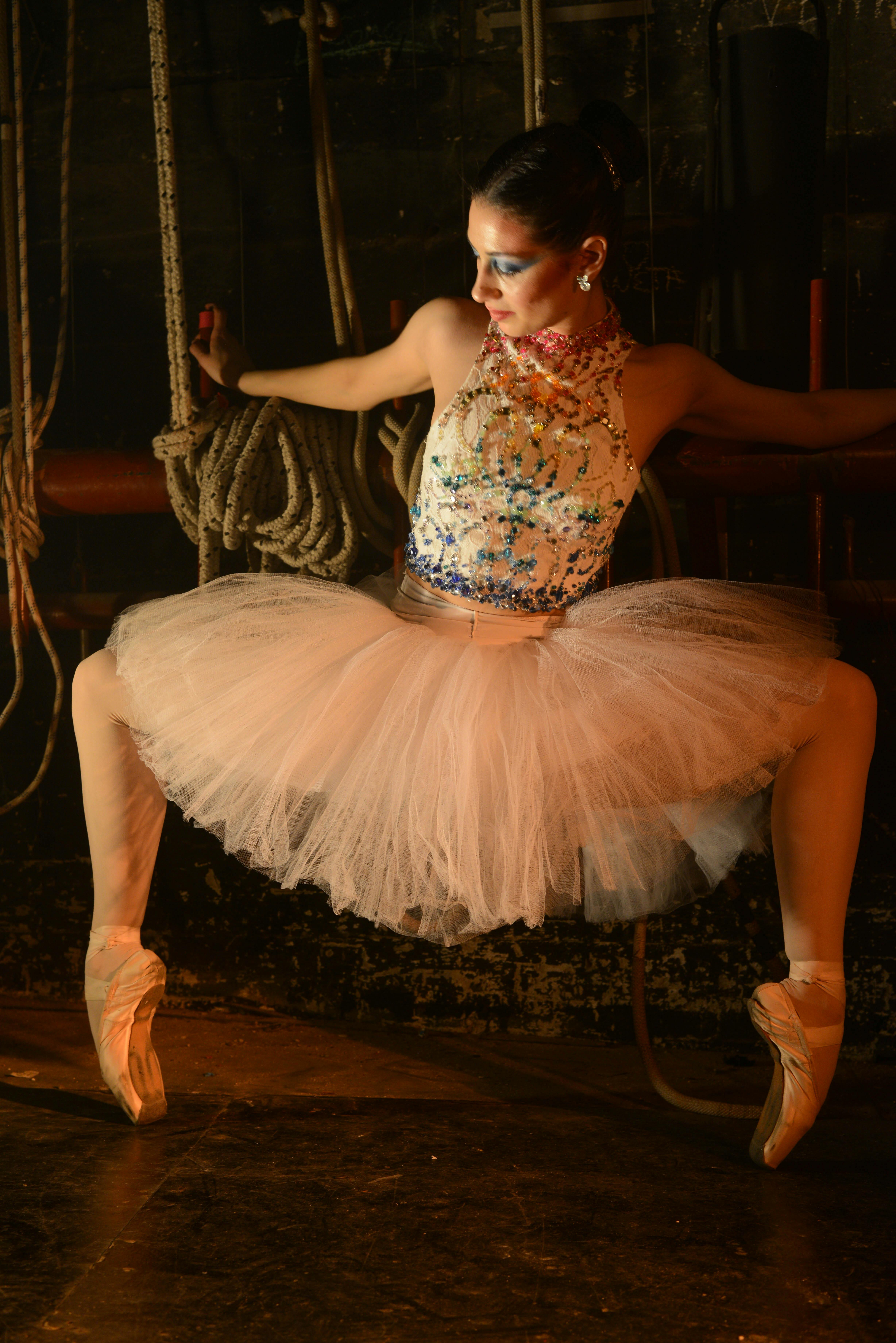 A Woman Dancing While Sitting · Free Stock Photo