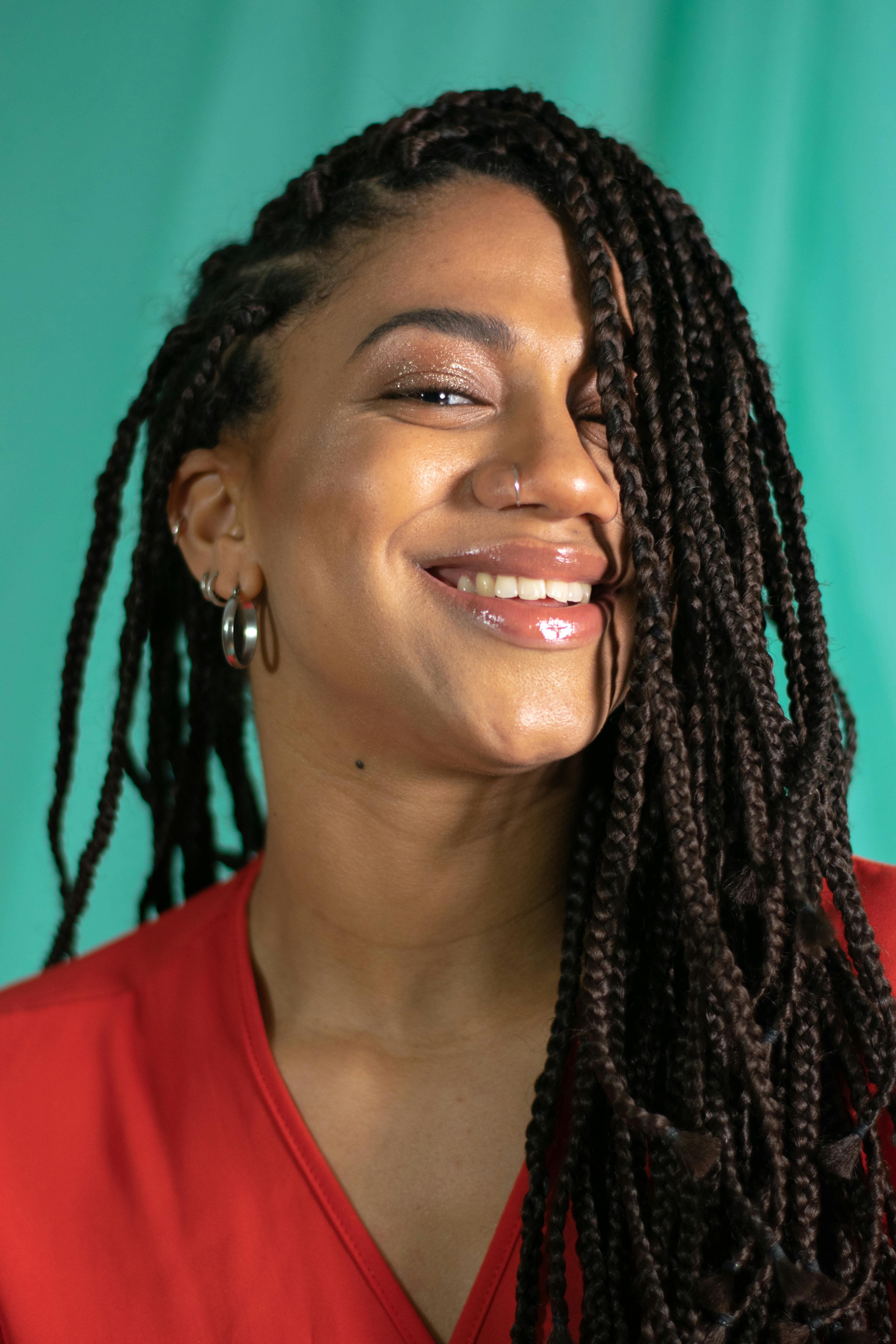 A Woman With Braids · Free Stock Photo