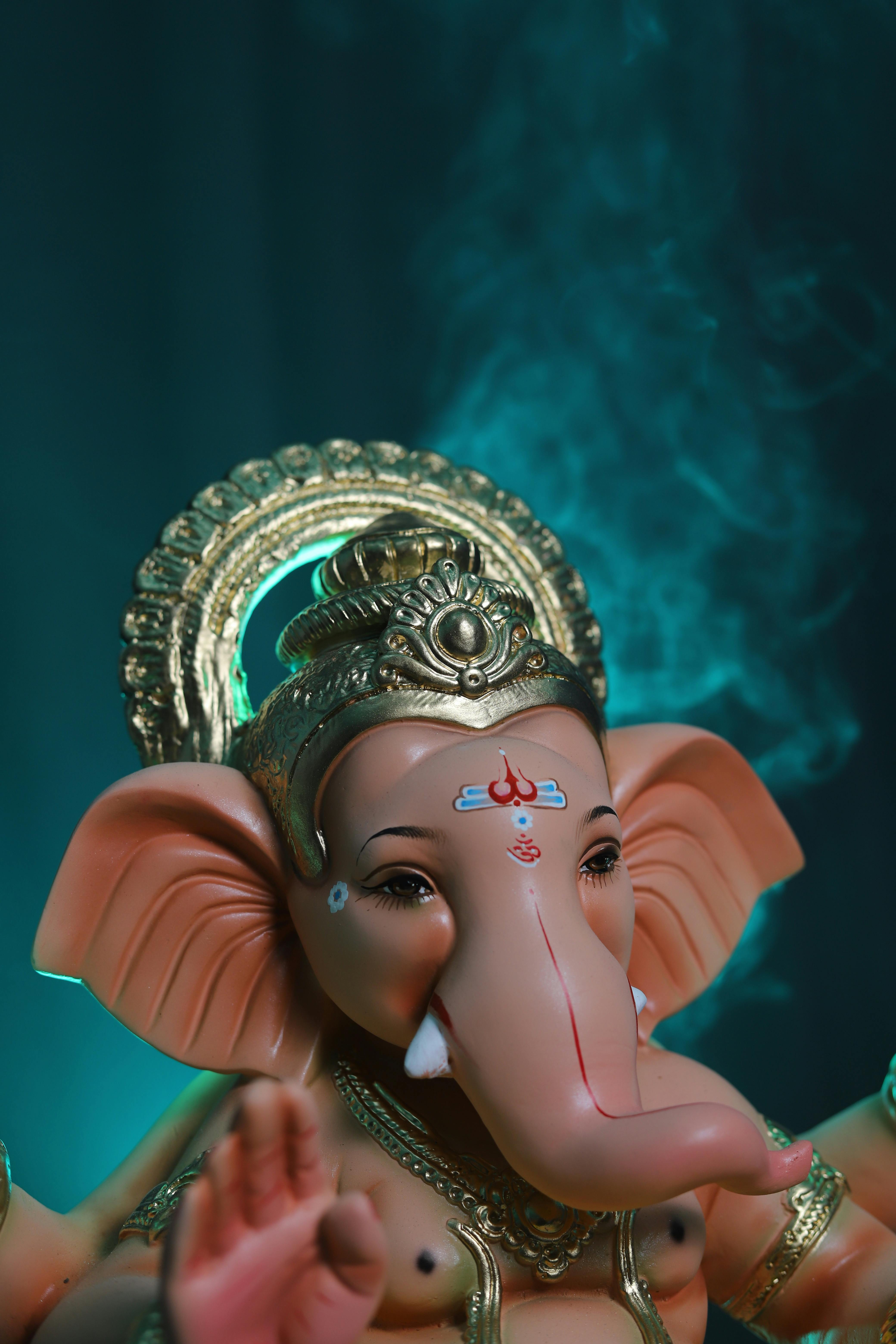 Close-Up Shot of a Figurine of Ganesha · Free Stock Photo