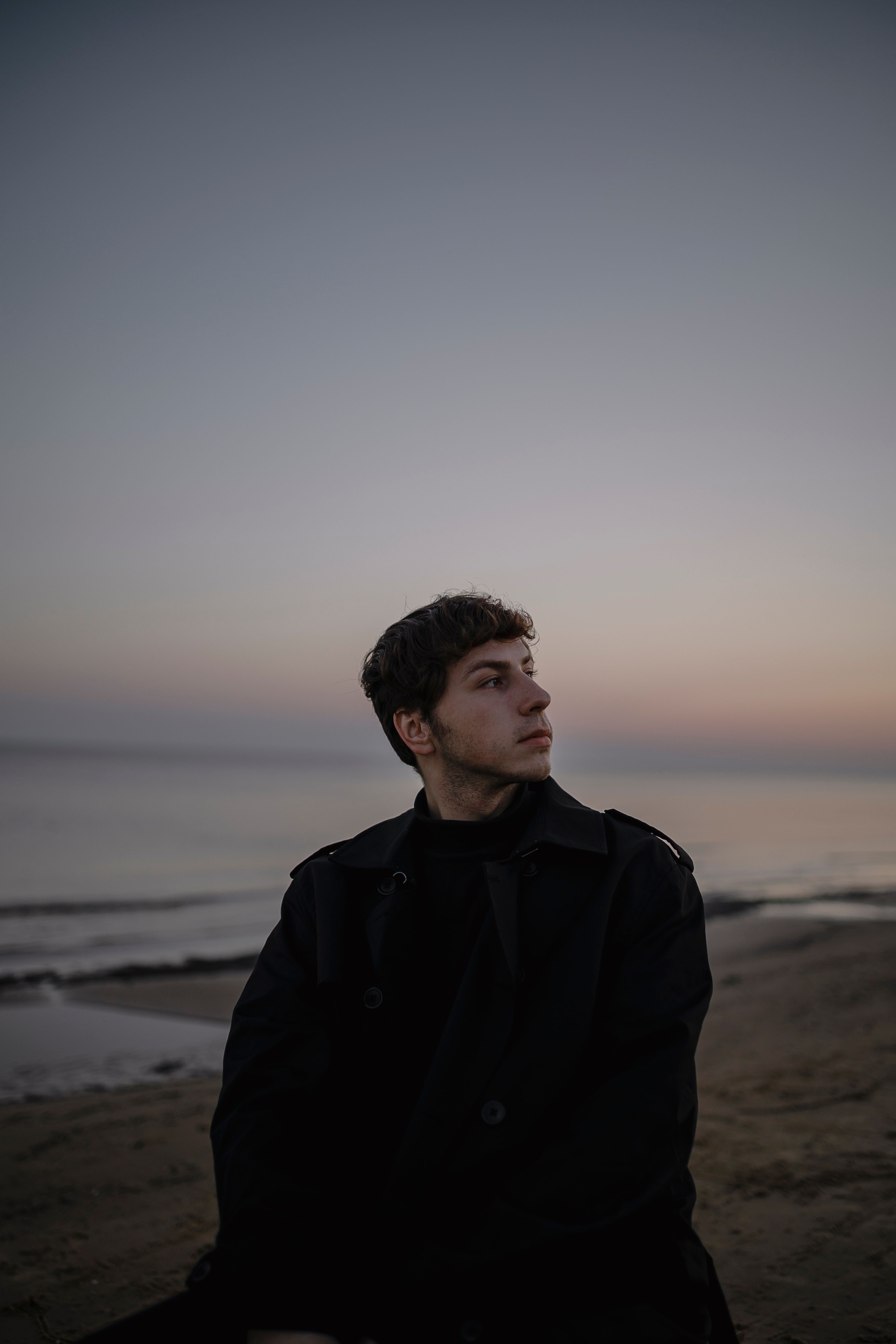 Man on Sea Shore at Dusk · Free Stock Photo