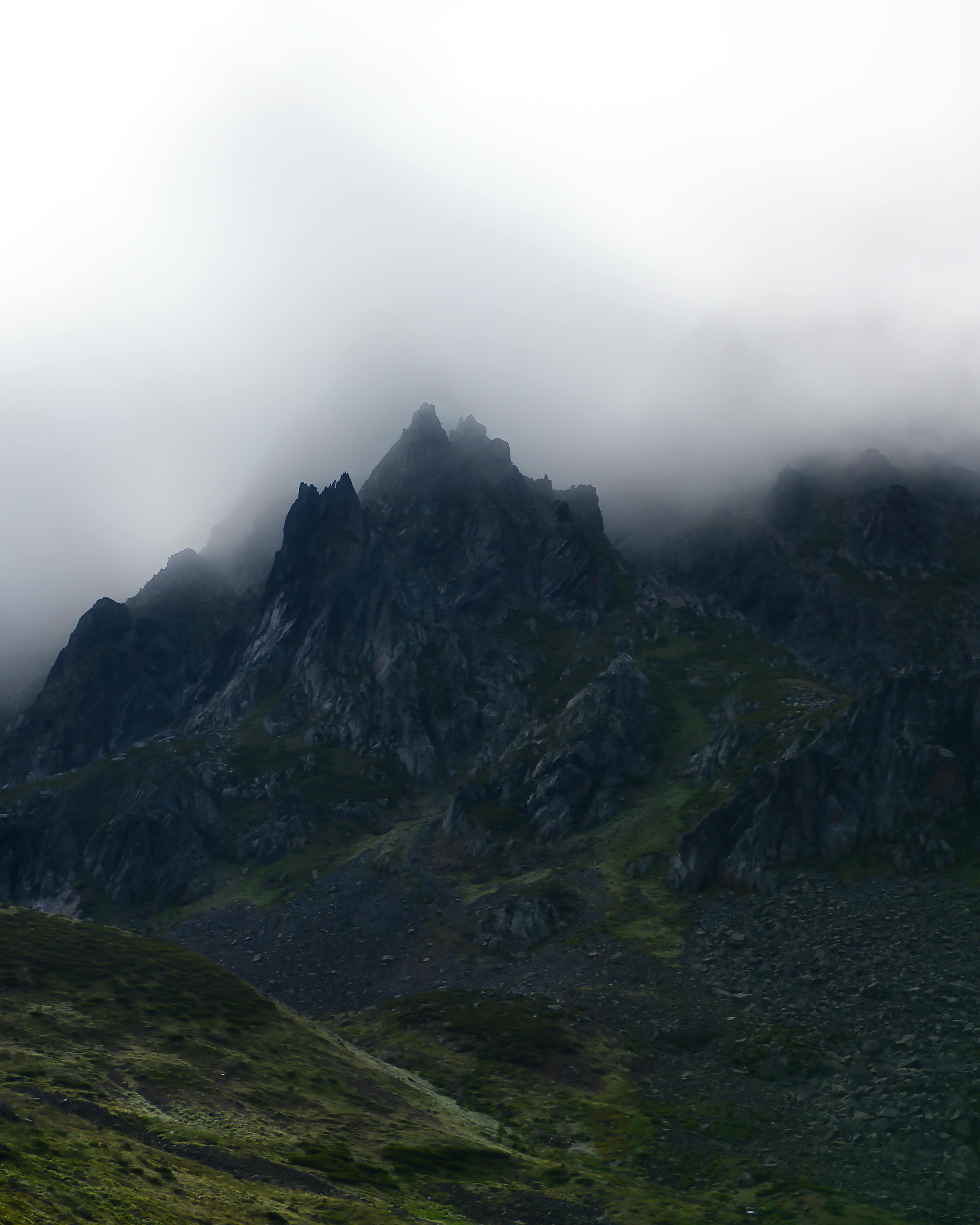 Rock Formation on Body of Water · Free Stock Photo