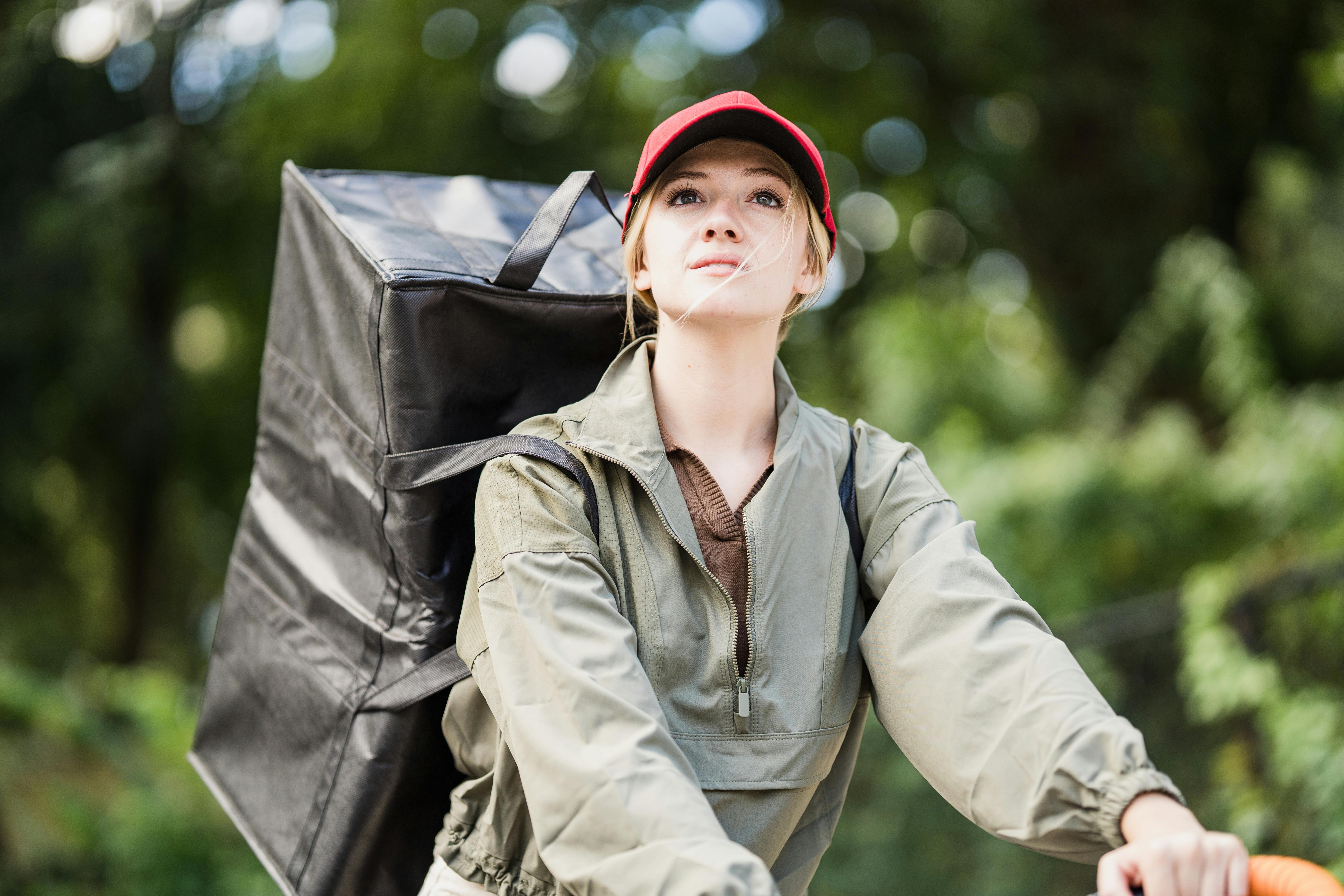 Woman Delivering a Package · Free Stock Photo
