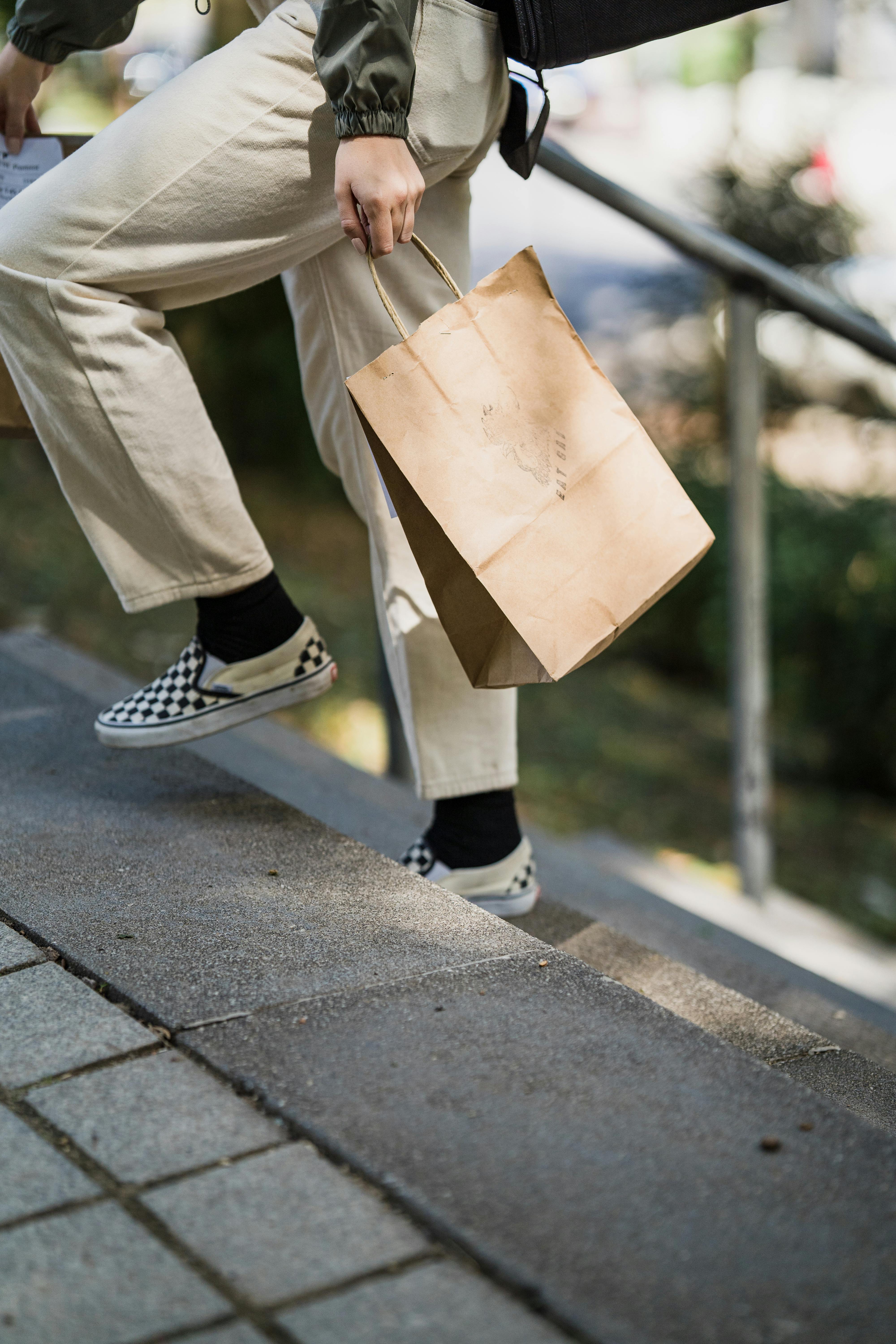 Woman with Bag Walking Stairs · Free Stock Photo
