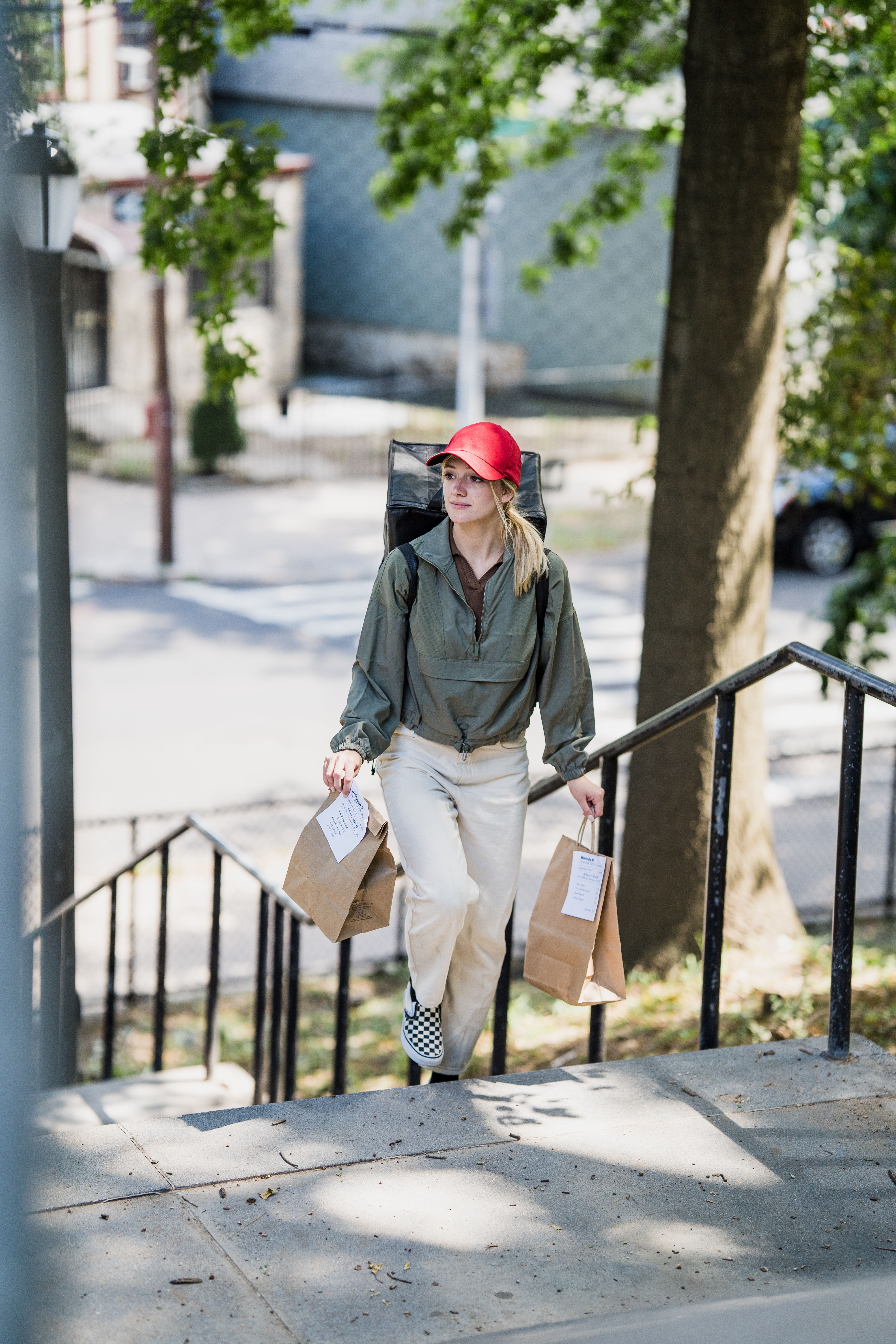 Courier Walking Stairs Delivering Orders · Free Stock Photo