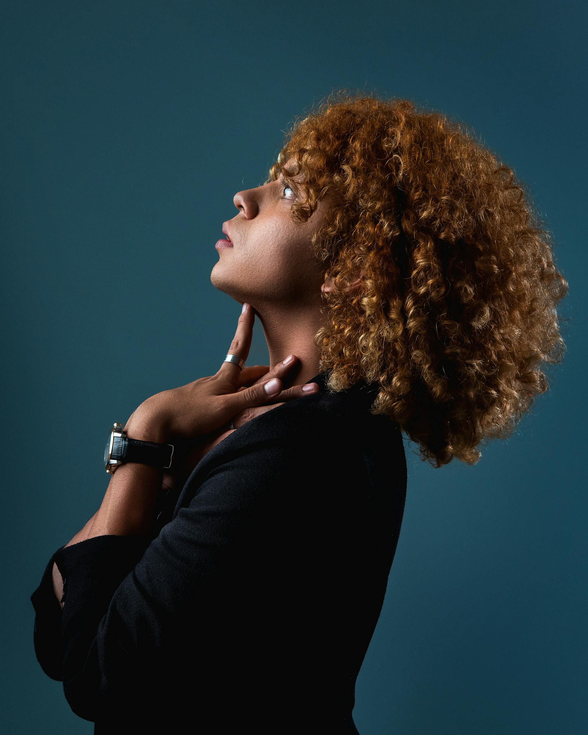 Woman Touching her Neck · Free Stock Photo