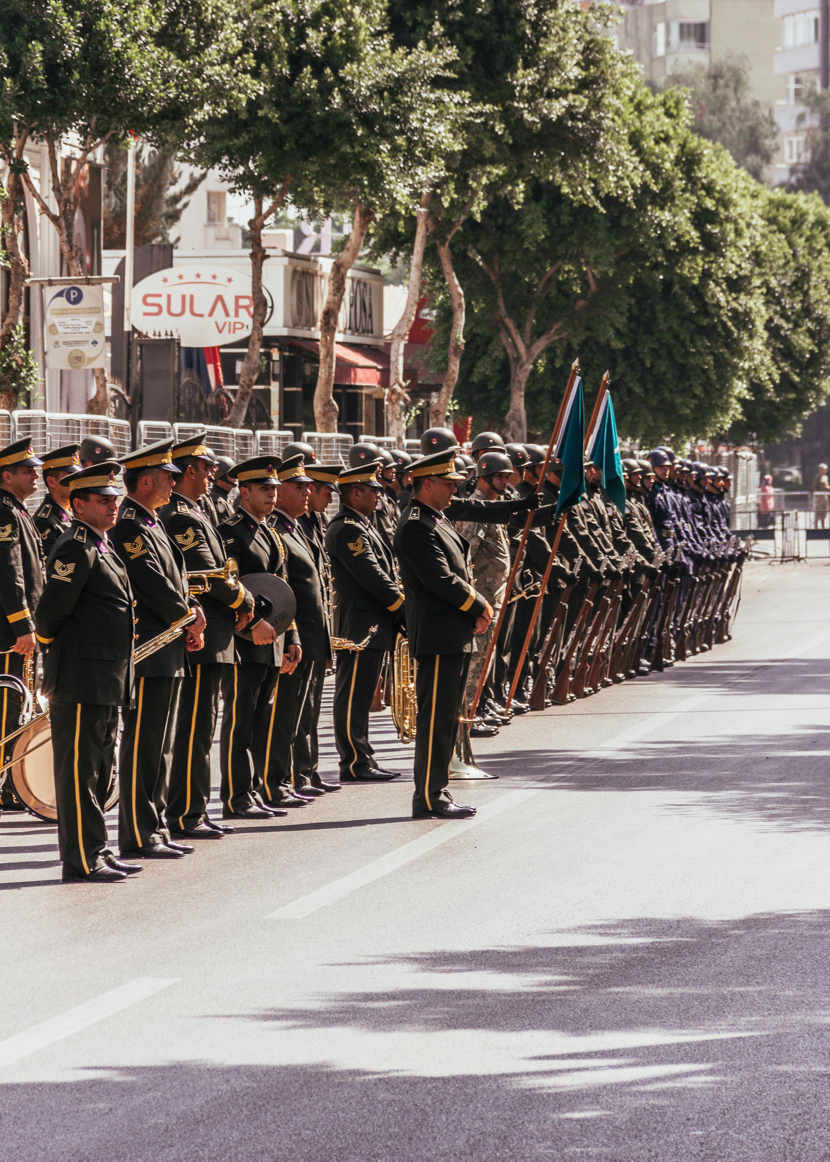 Men Wearing Military Uniforms on Parade · Free Stock Photo