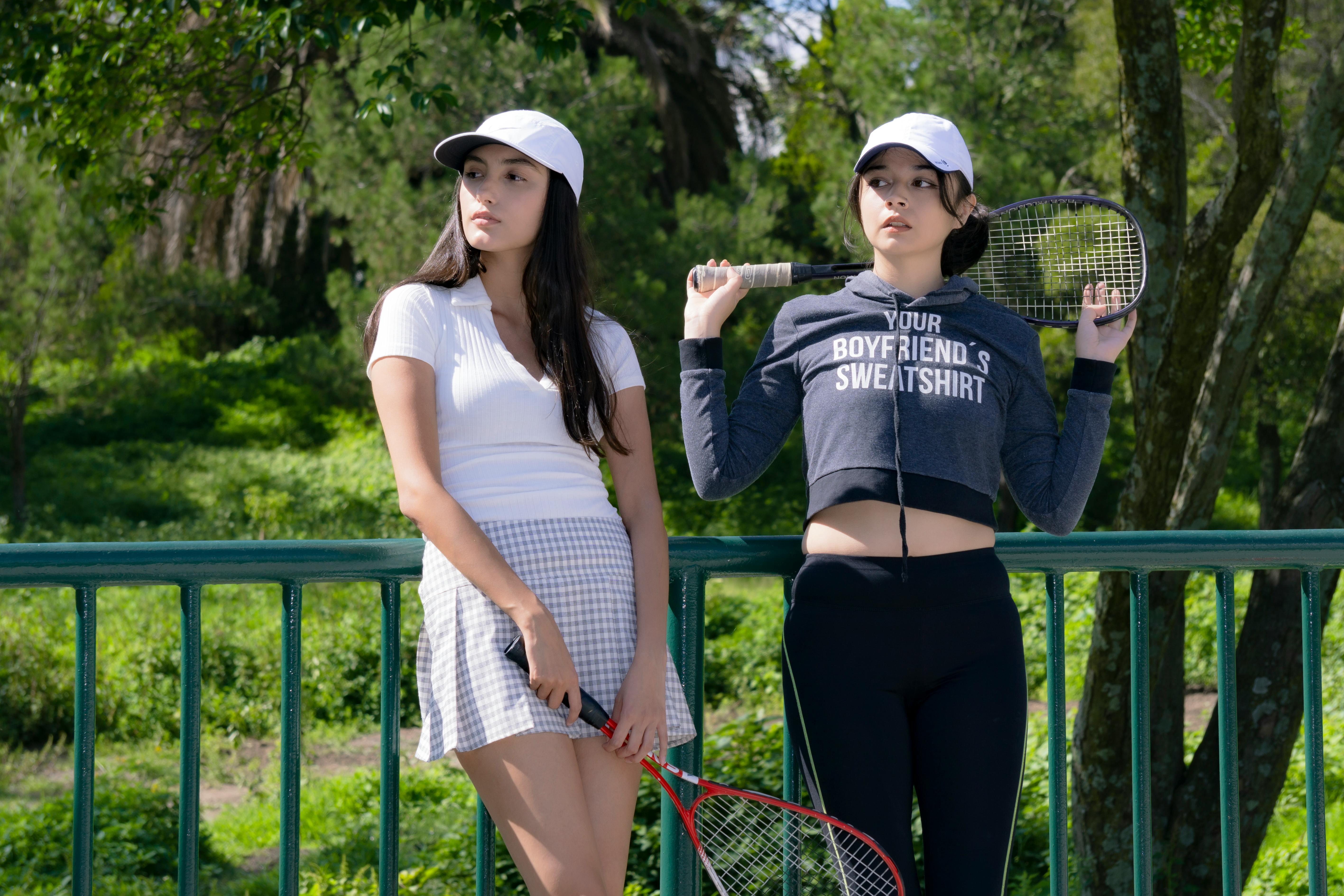 Beautiful Women Holding Tennis Rackets · Free Stock Photo