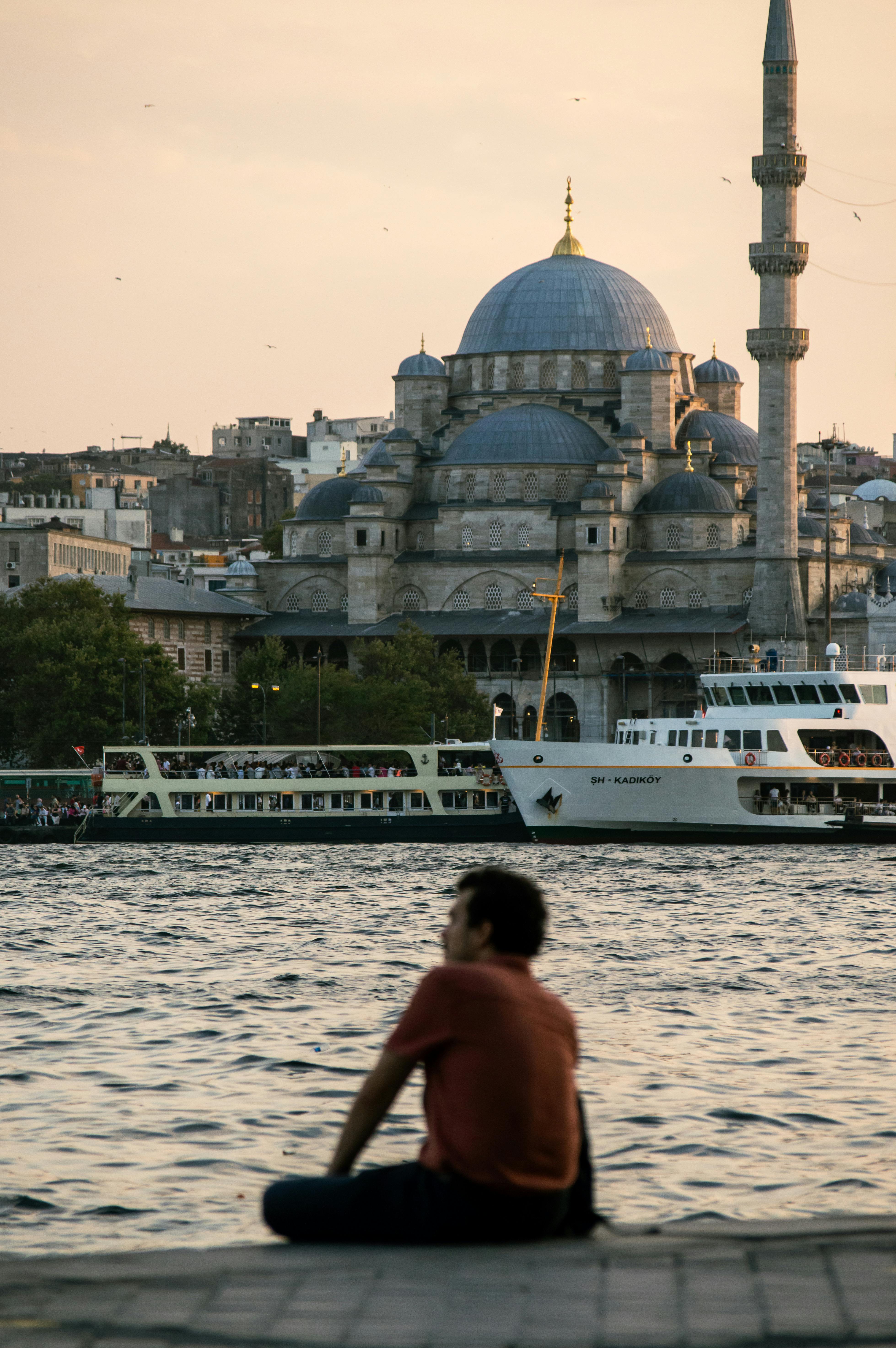 Man in Front of Traditional Mosque · Free Stock Photo