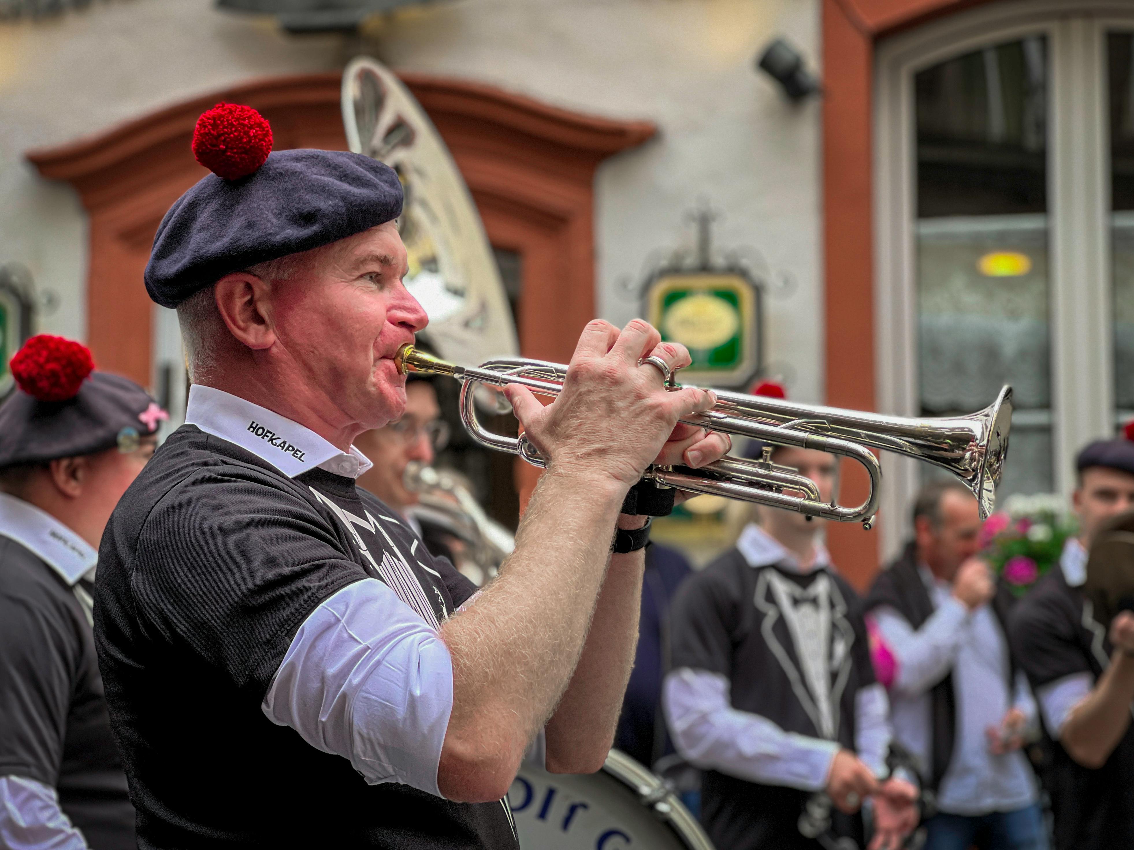 Man Playing Brass Instrument during Daytime · Free Stock Photo