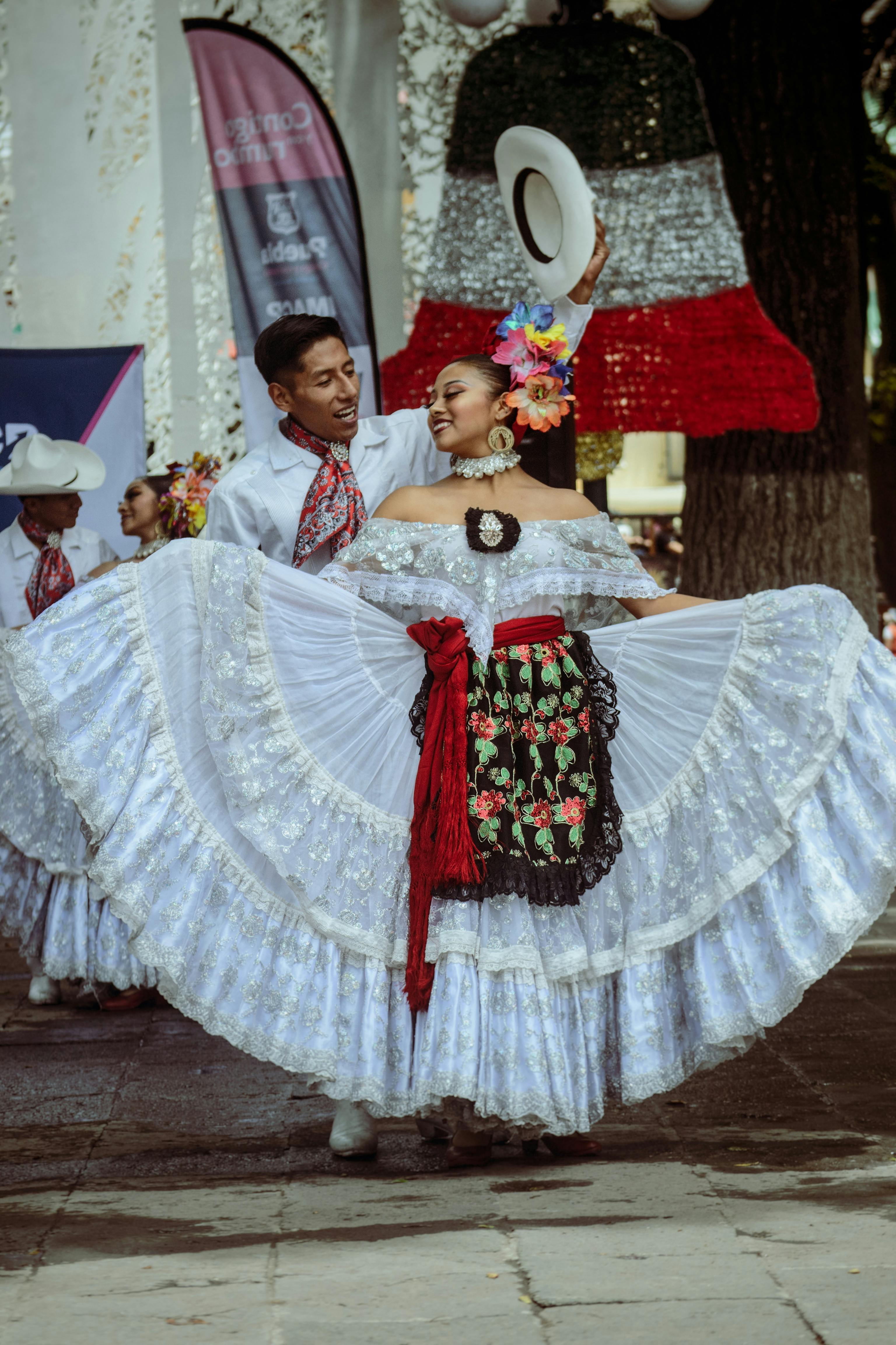 Two Women Performing in Costumes · Free Stock Photo