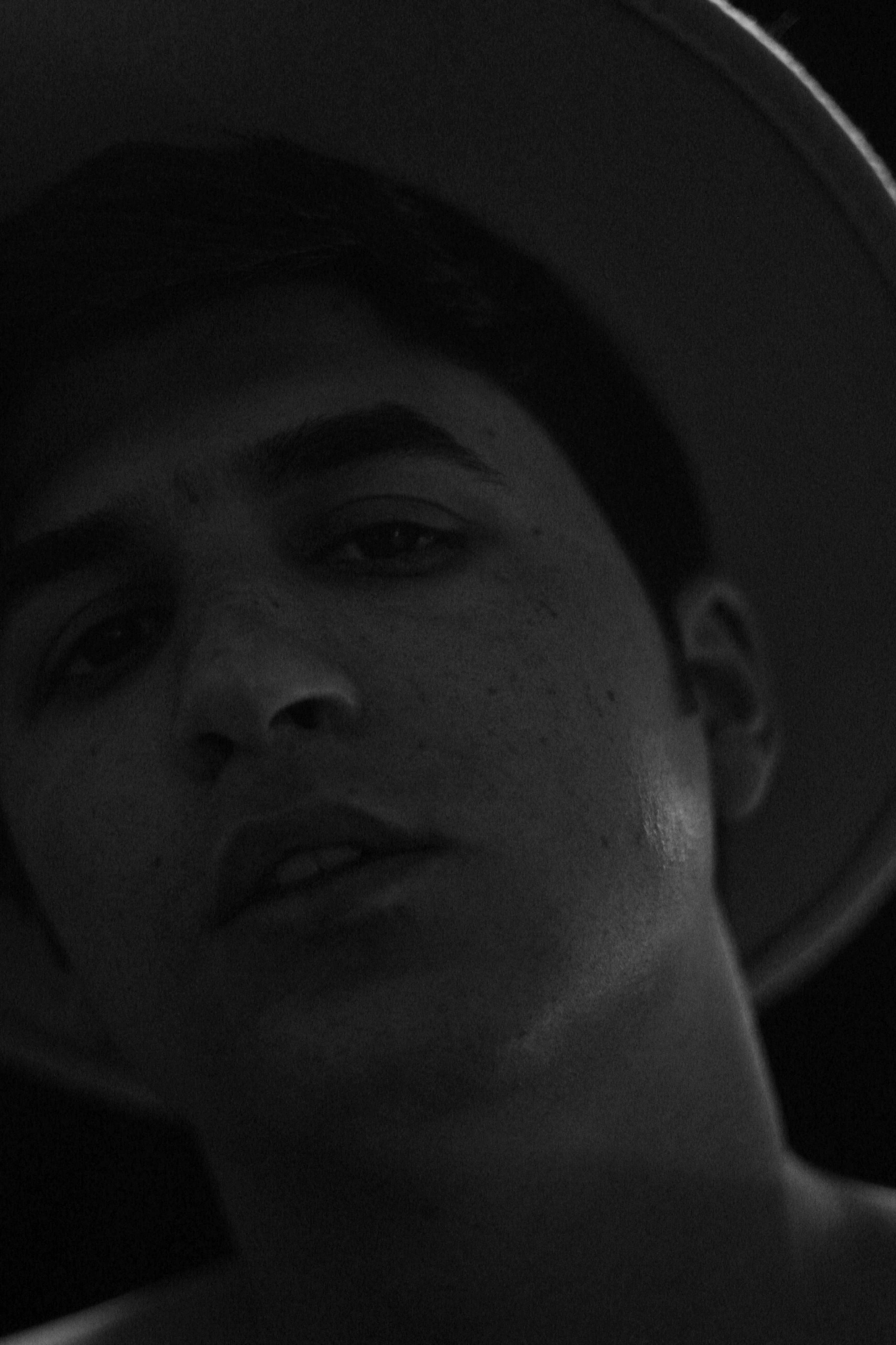 Grayscale Photo of Man Wearing Blue Mask · Free Stock Photo