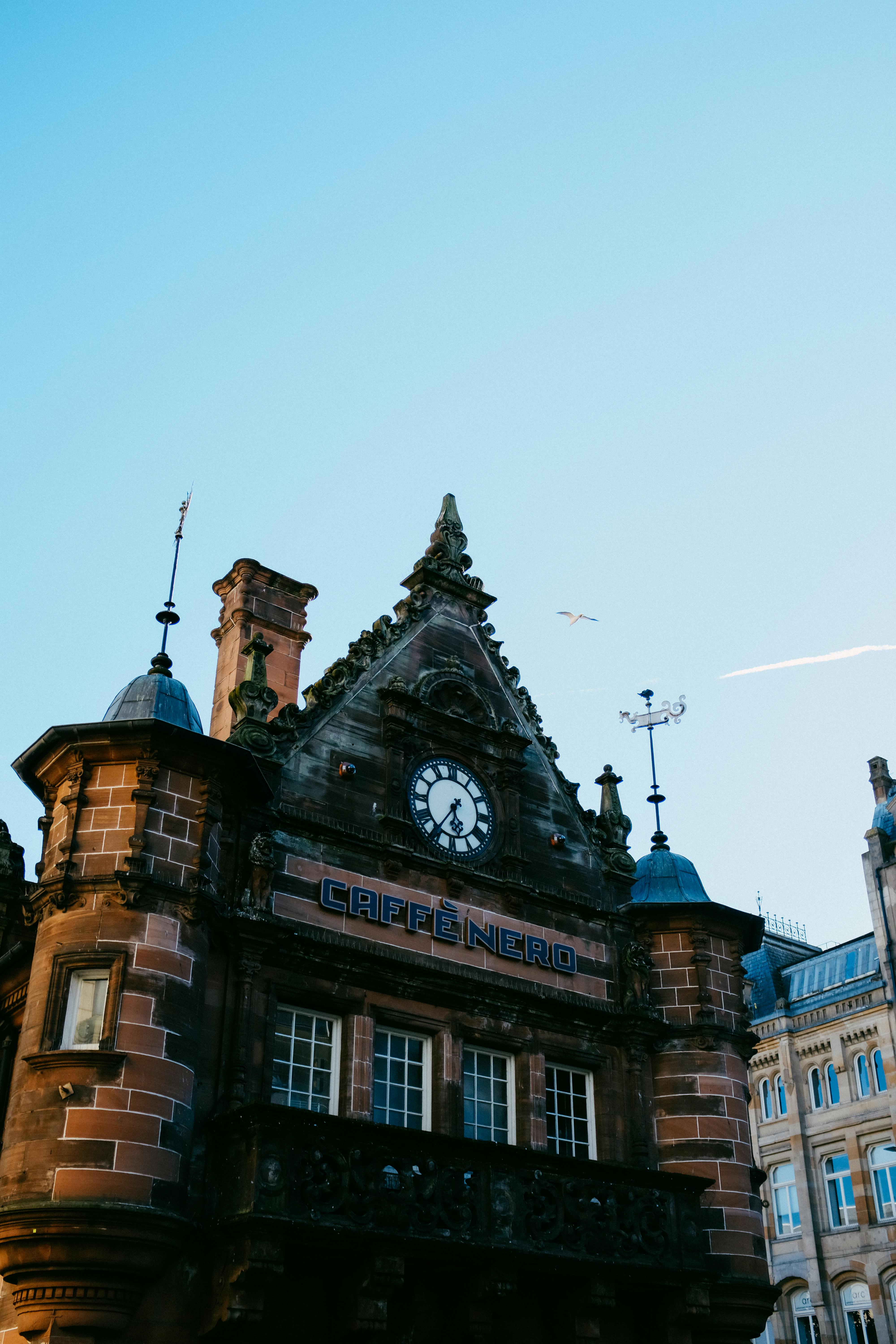 Analog Clack in an Ancient Building · Free Stock Photo