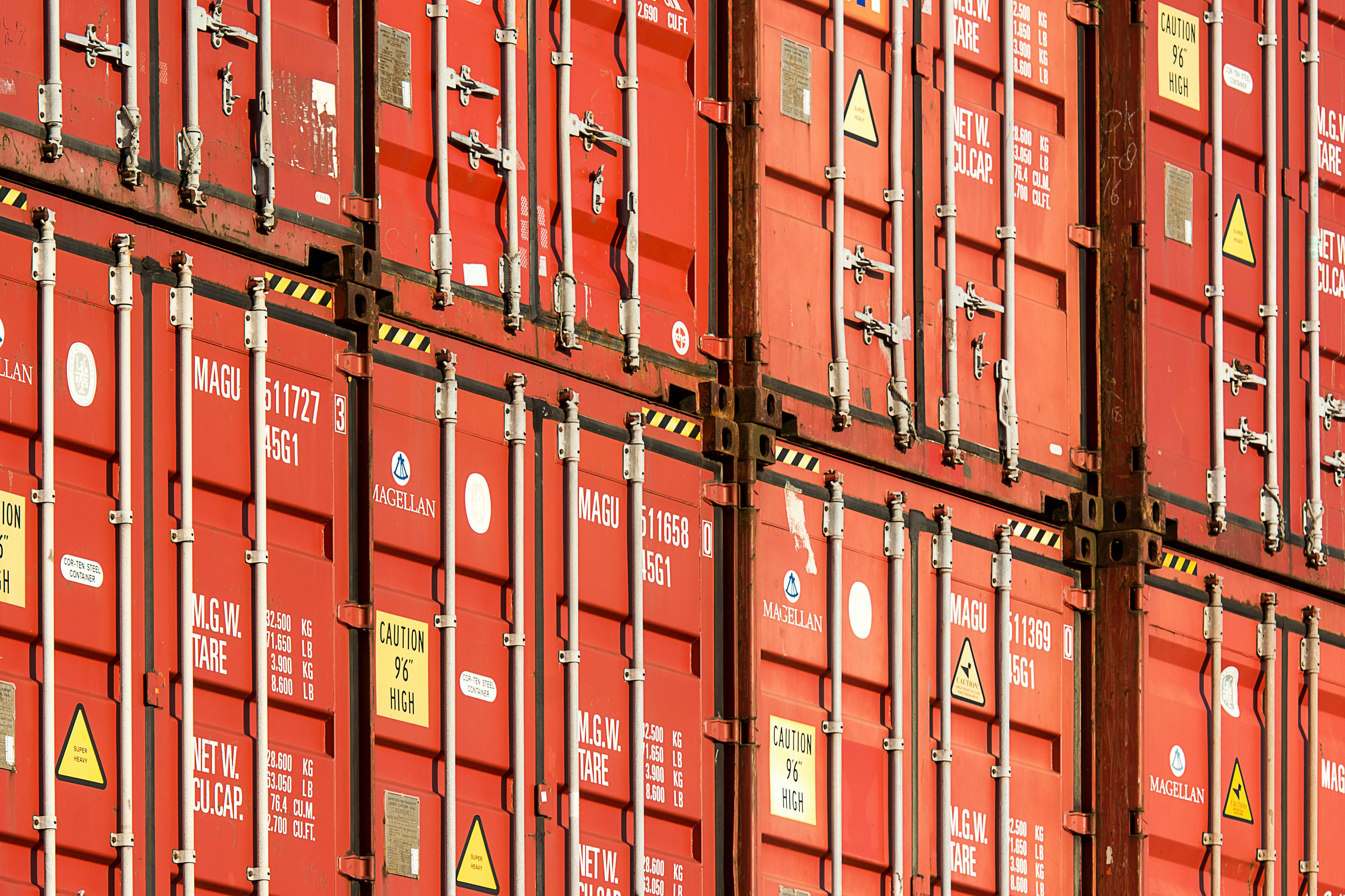 Red and Blue Intermodal Containers · Free Stock Photo