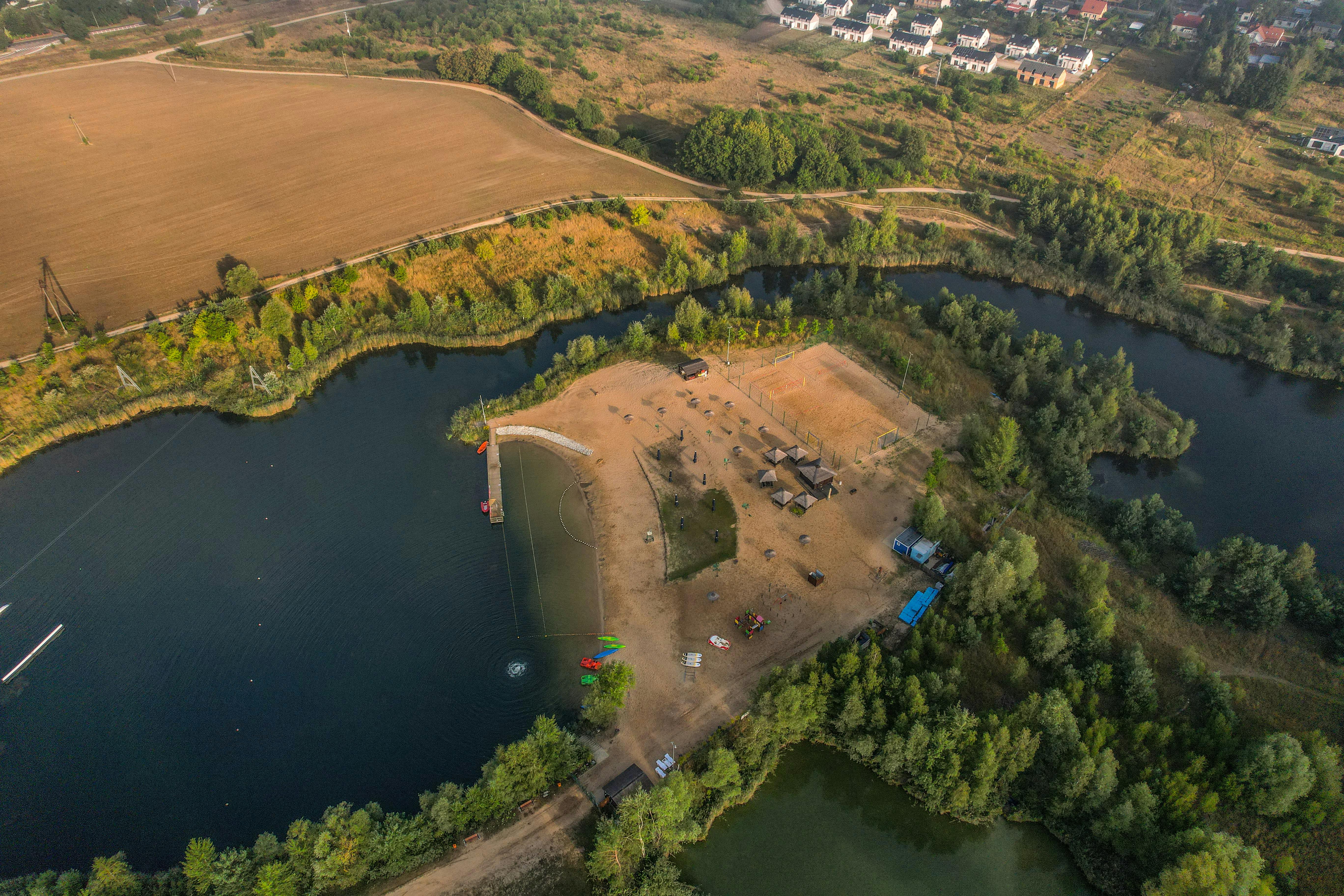 Lake with Beach in Countryside · Free Stock Photo