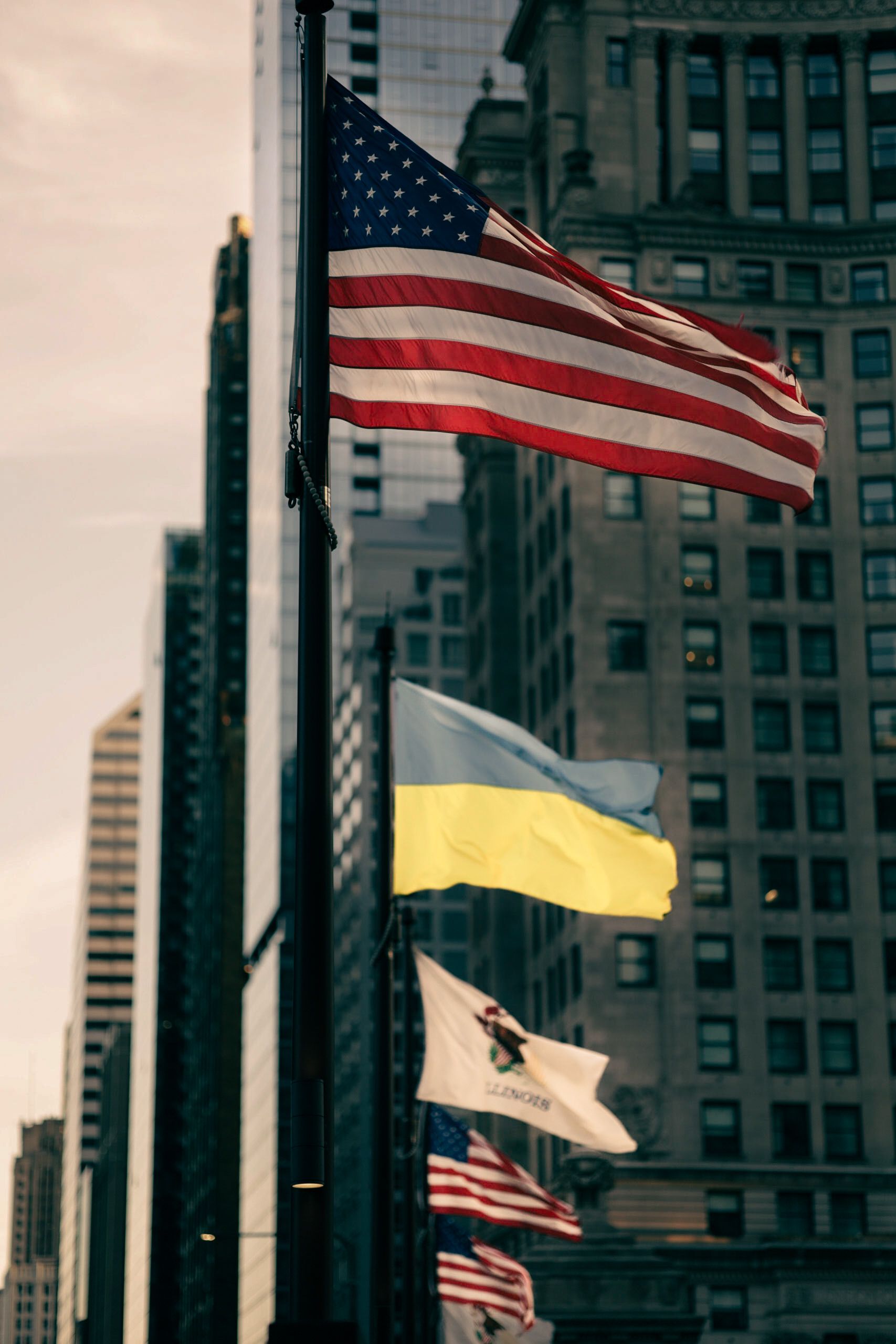 Philippines Flag Swaying by the Wind Under White Sky · Free Stock Photo