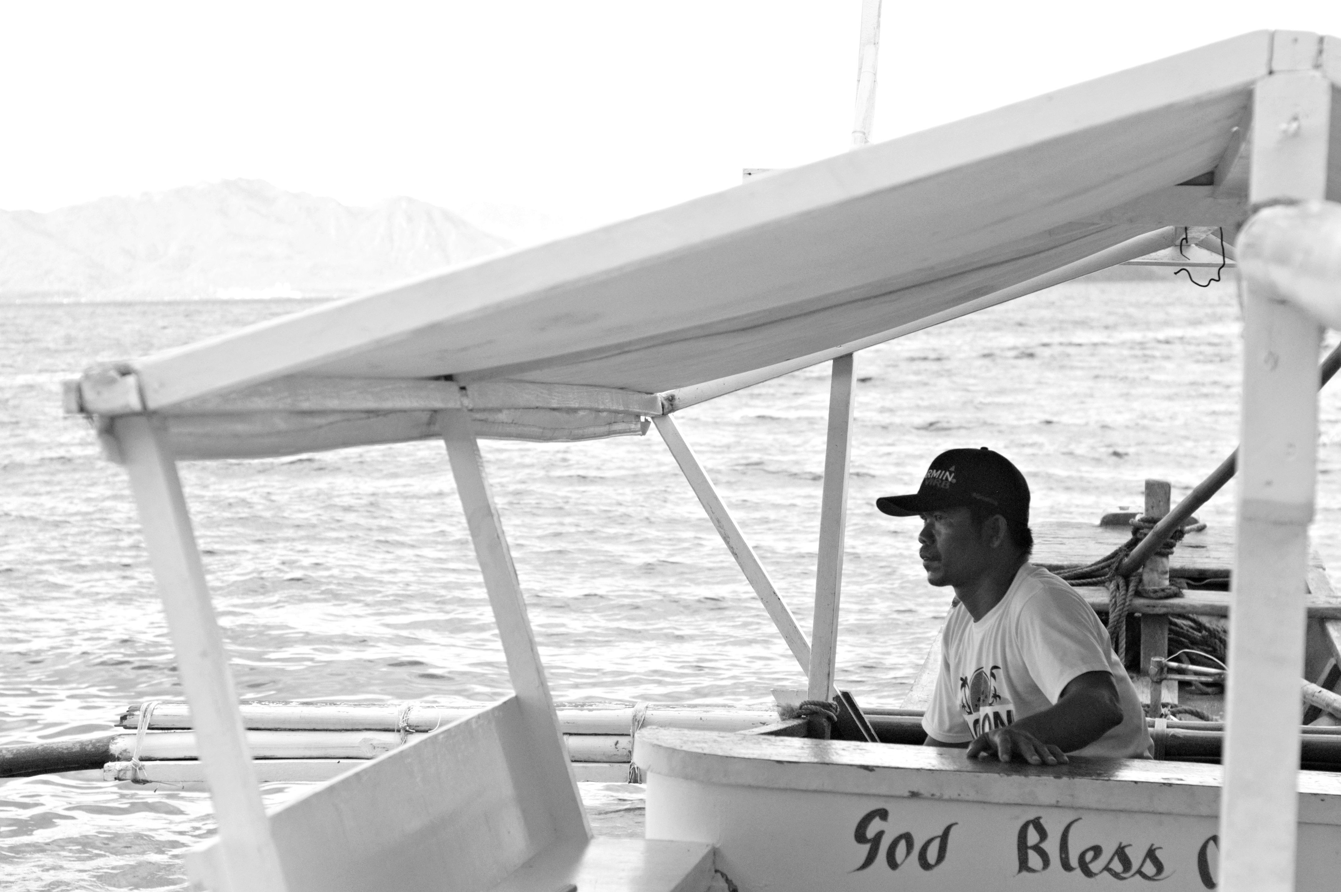 Free stock photo of boat, boat man, by the sea