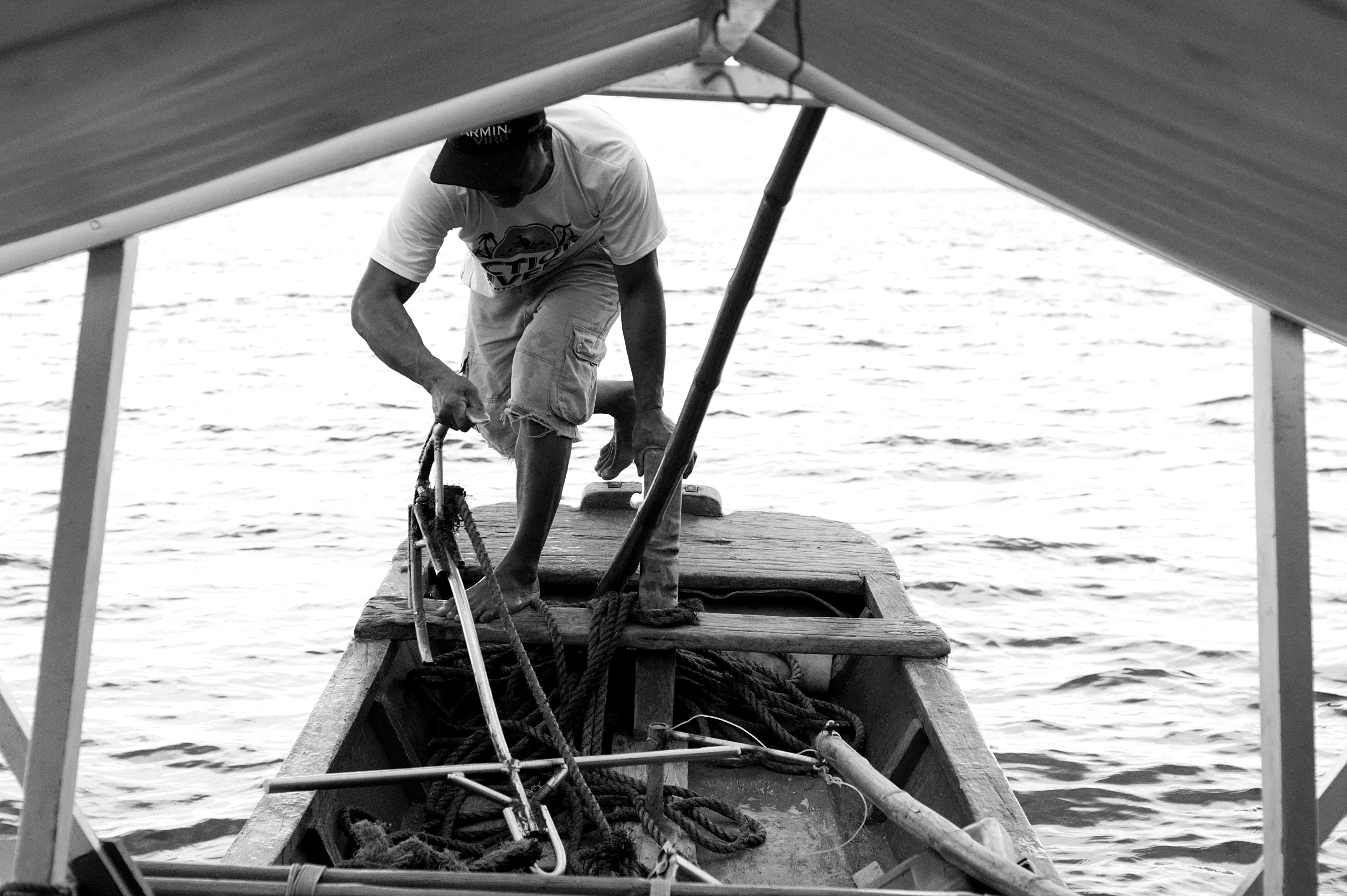 Free stock photo of boat, boat man, by the sea