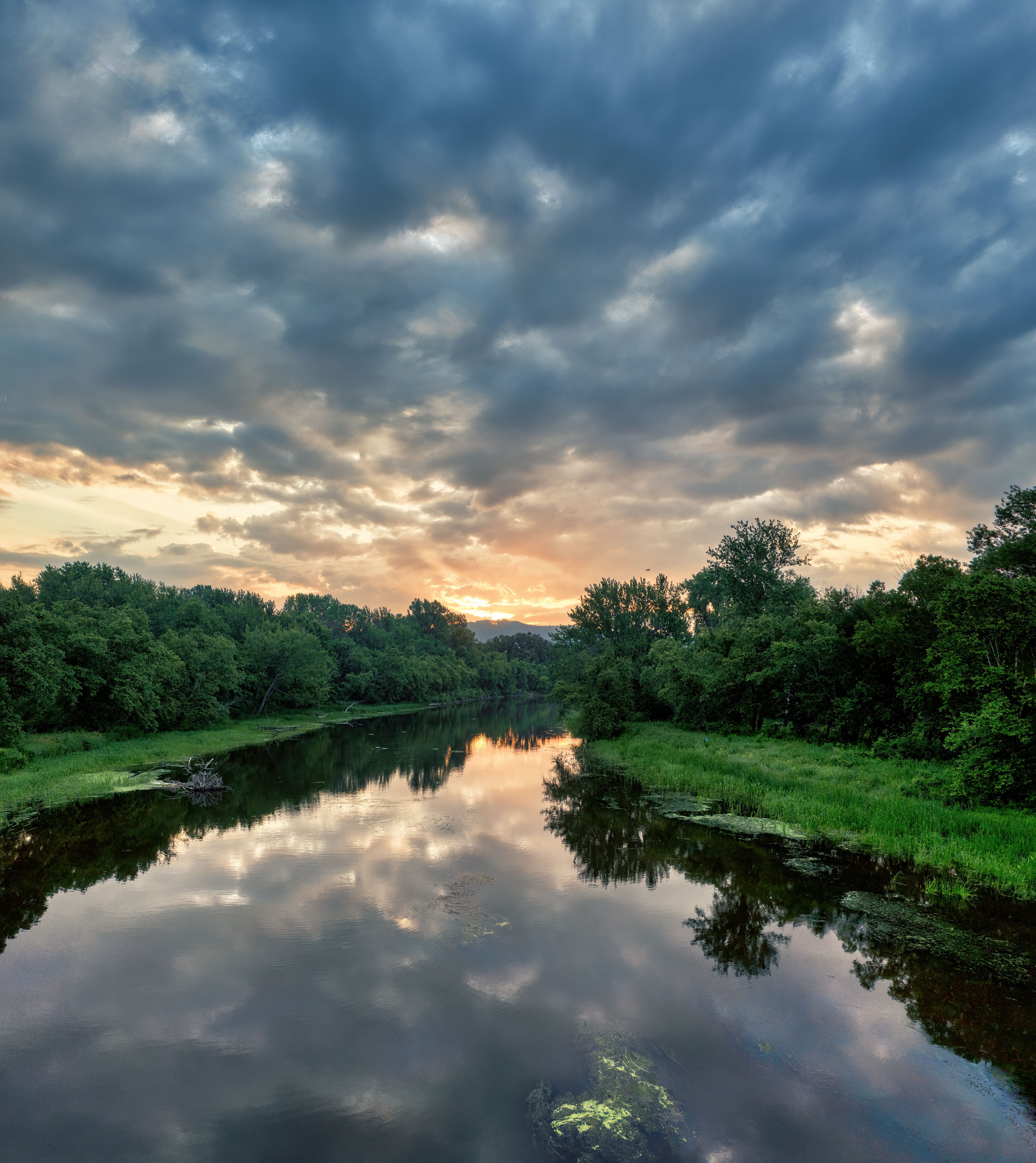 Clouds over River at Sunset · Free Stock Photo