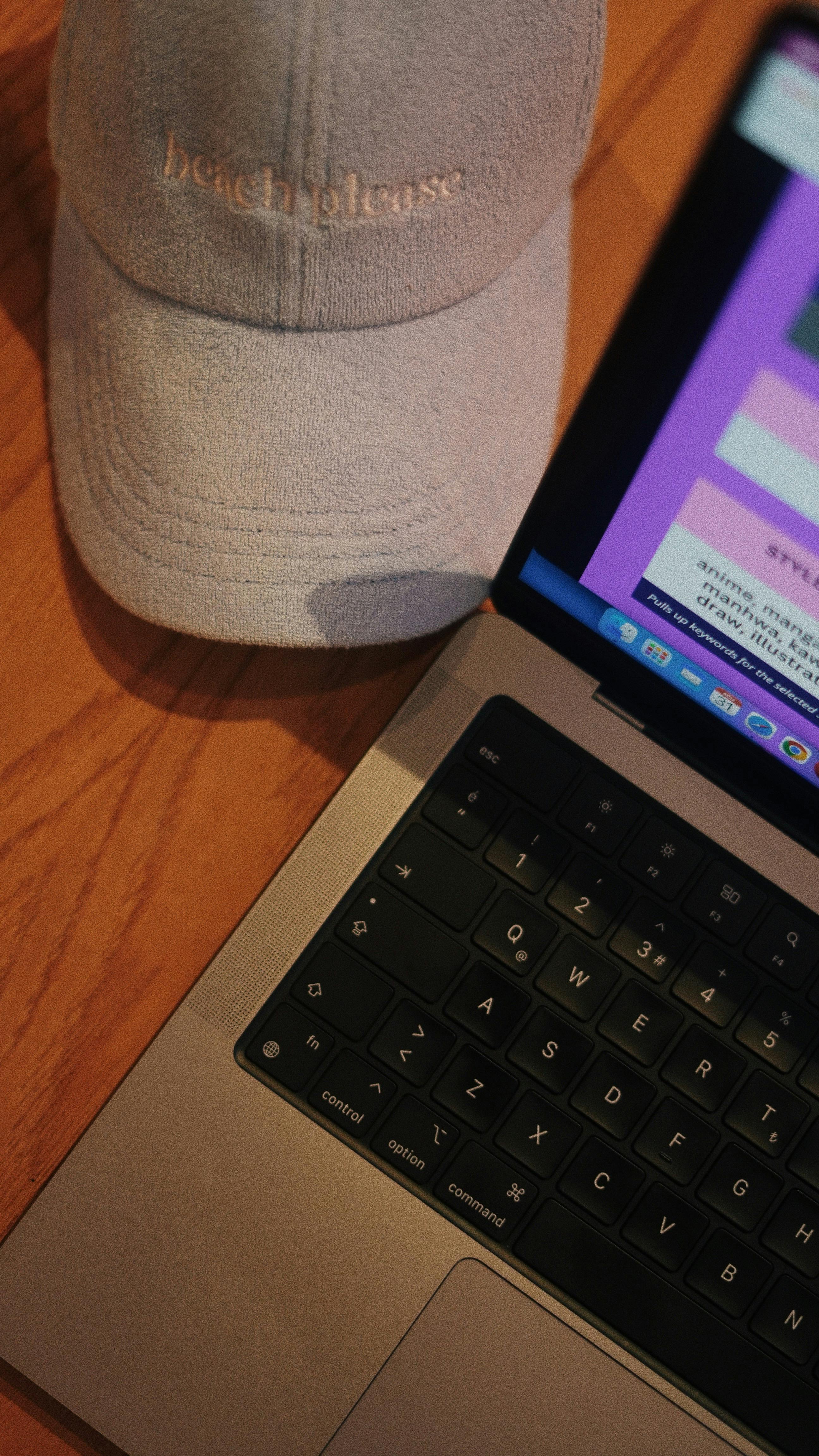 A Laptop on a White Surface · Free Stock Photo