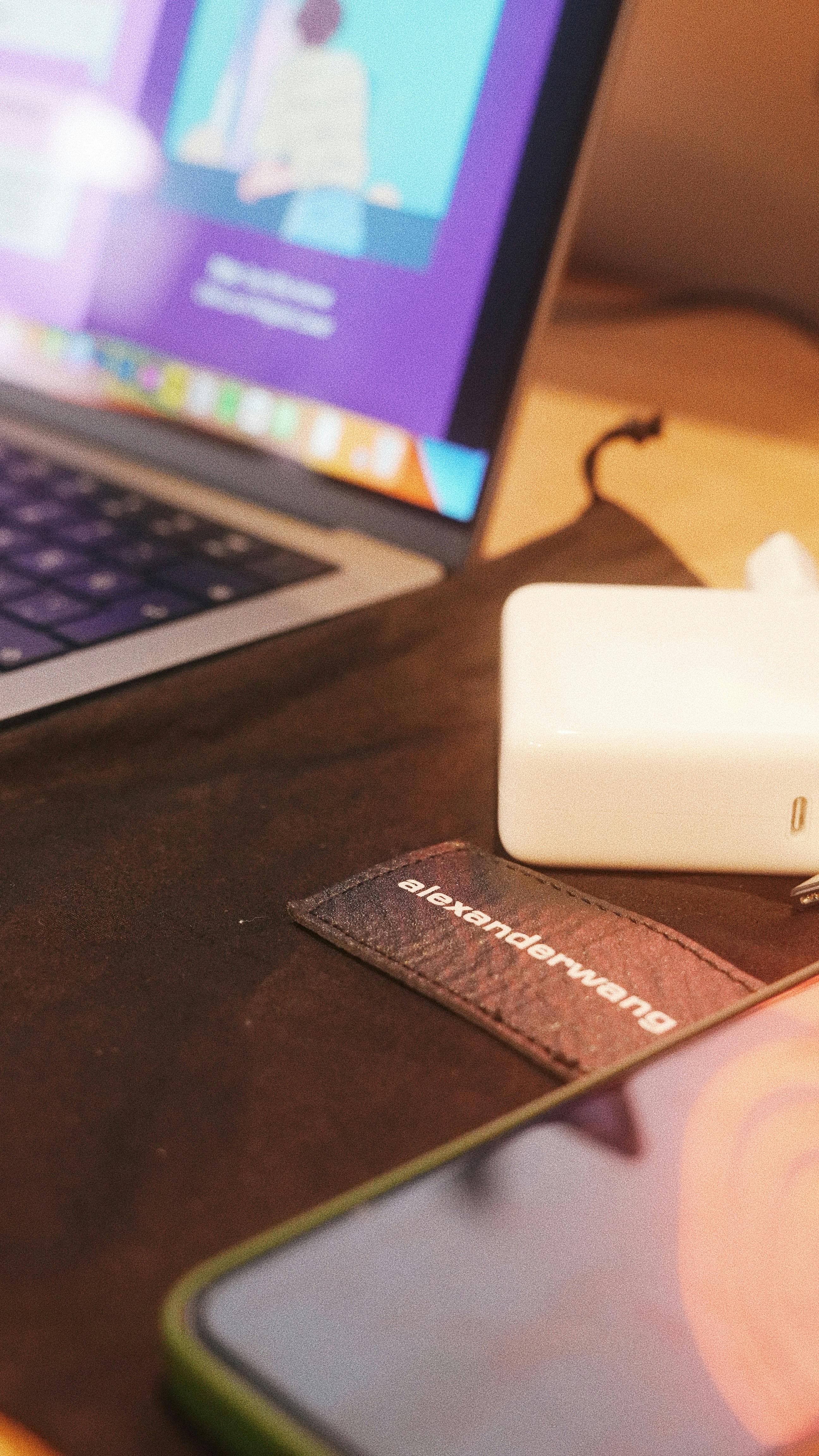 Smartphone and Laptop on a Desk · Free Stock Photo