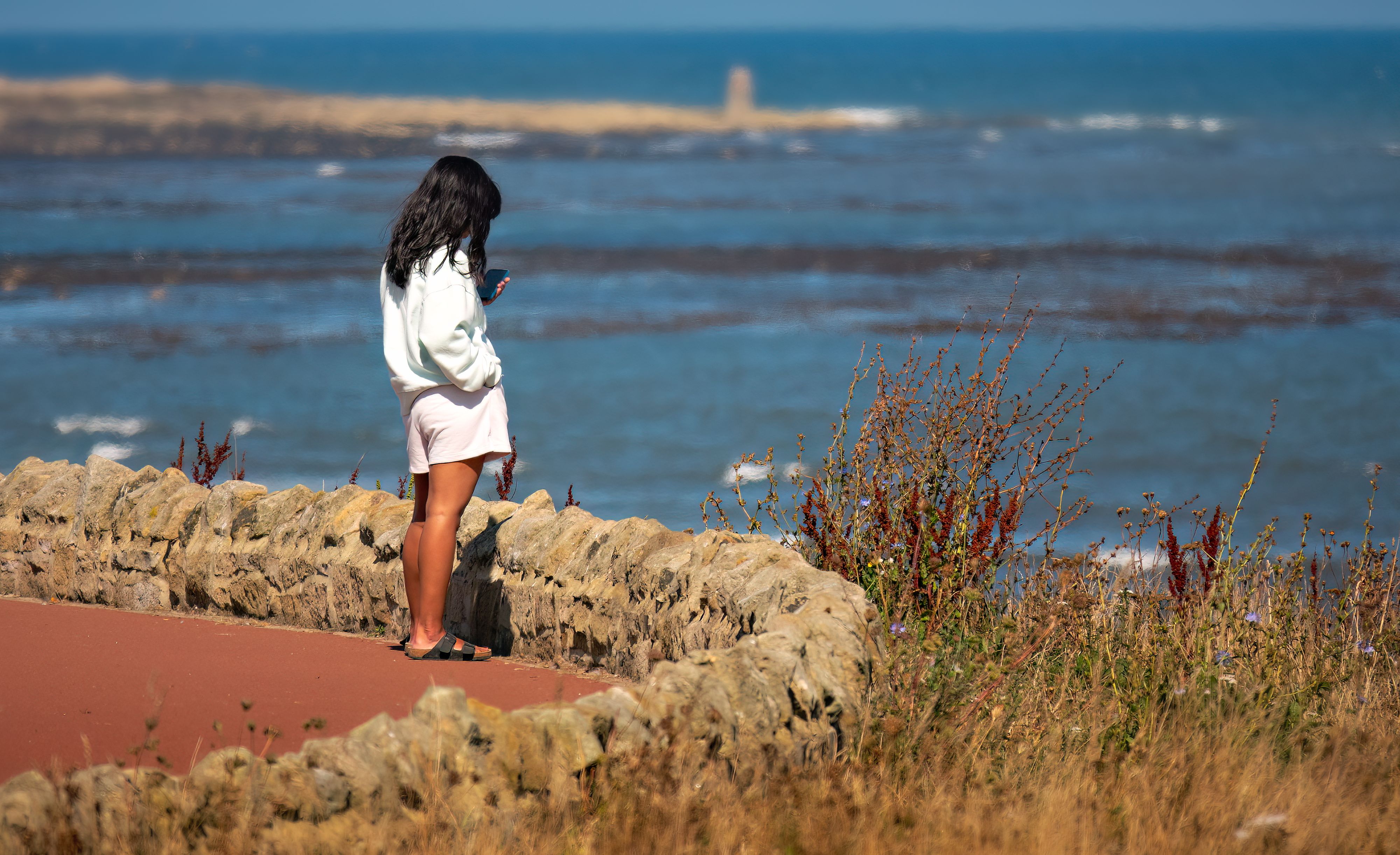Portrait of a Woman Standing in Water · Free Stock Photo