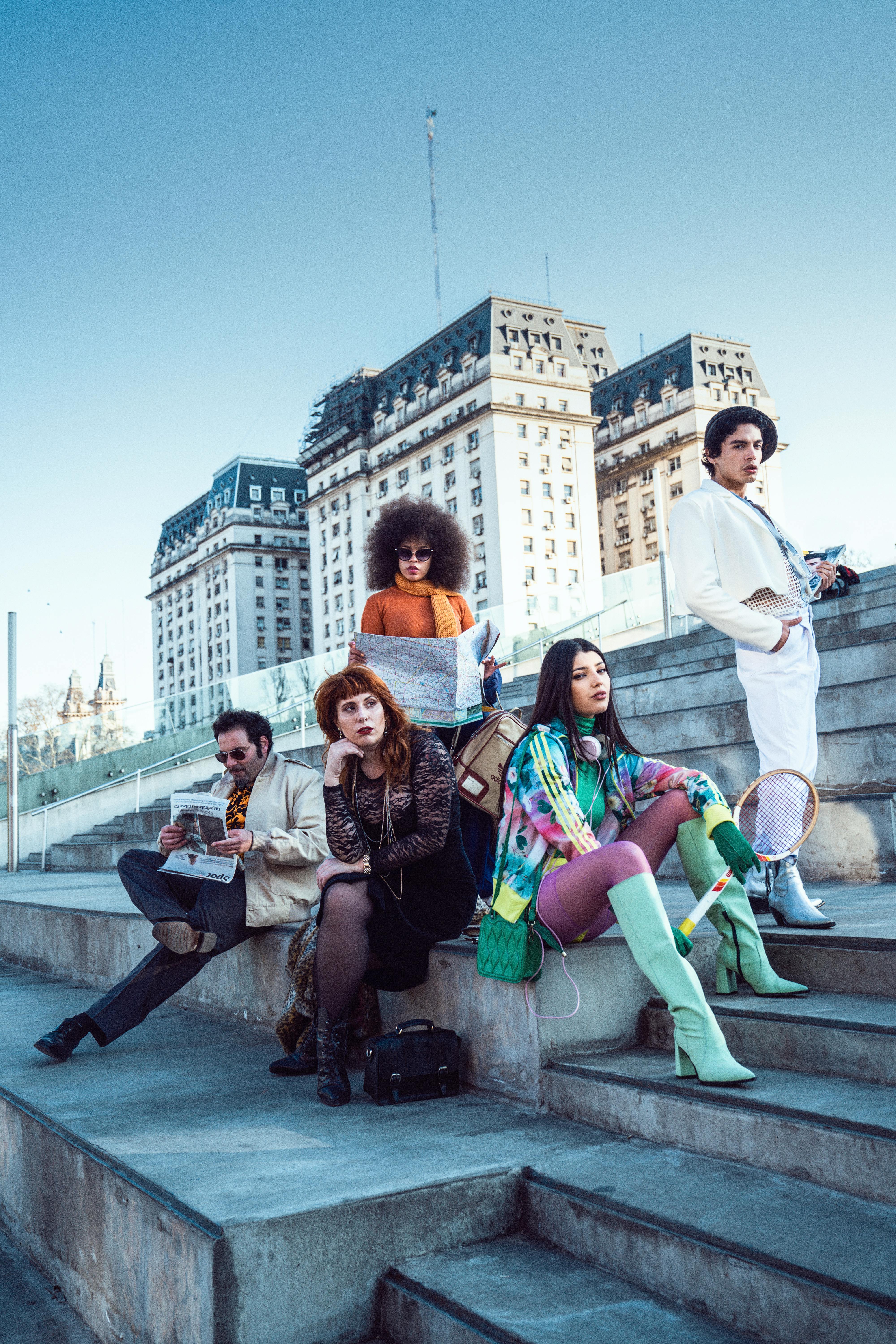 Stylish People Posing on Stairs · Free Stock Photo