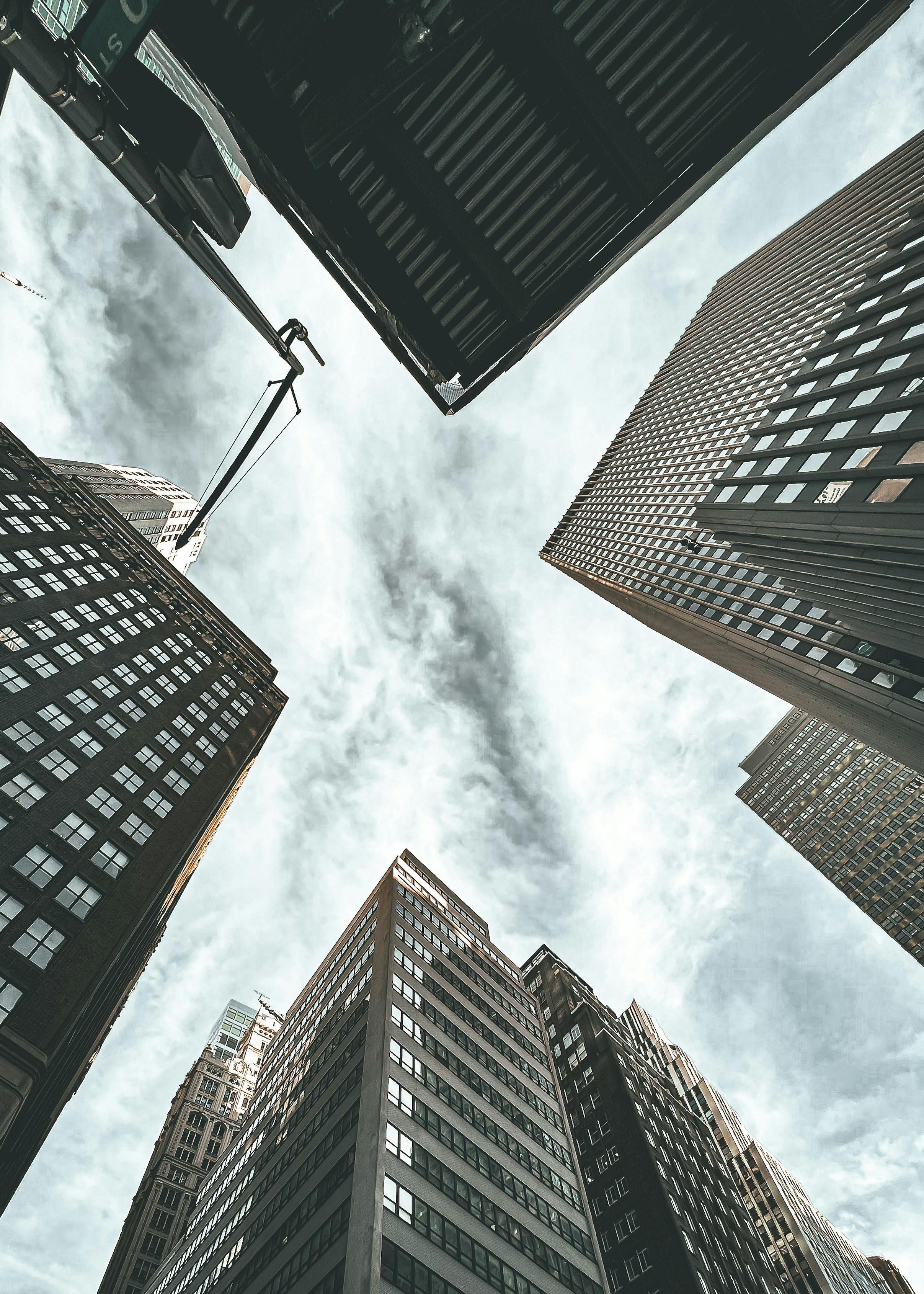 High Rise Buildings Under White Clouds · Free Stock Photo