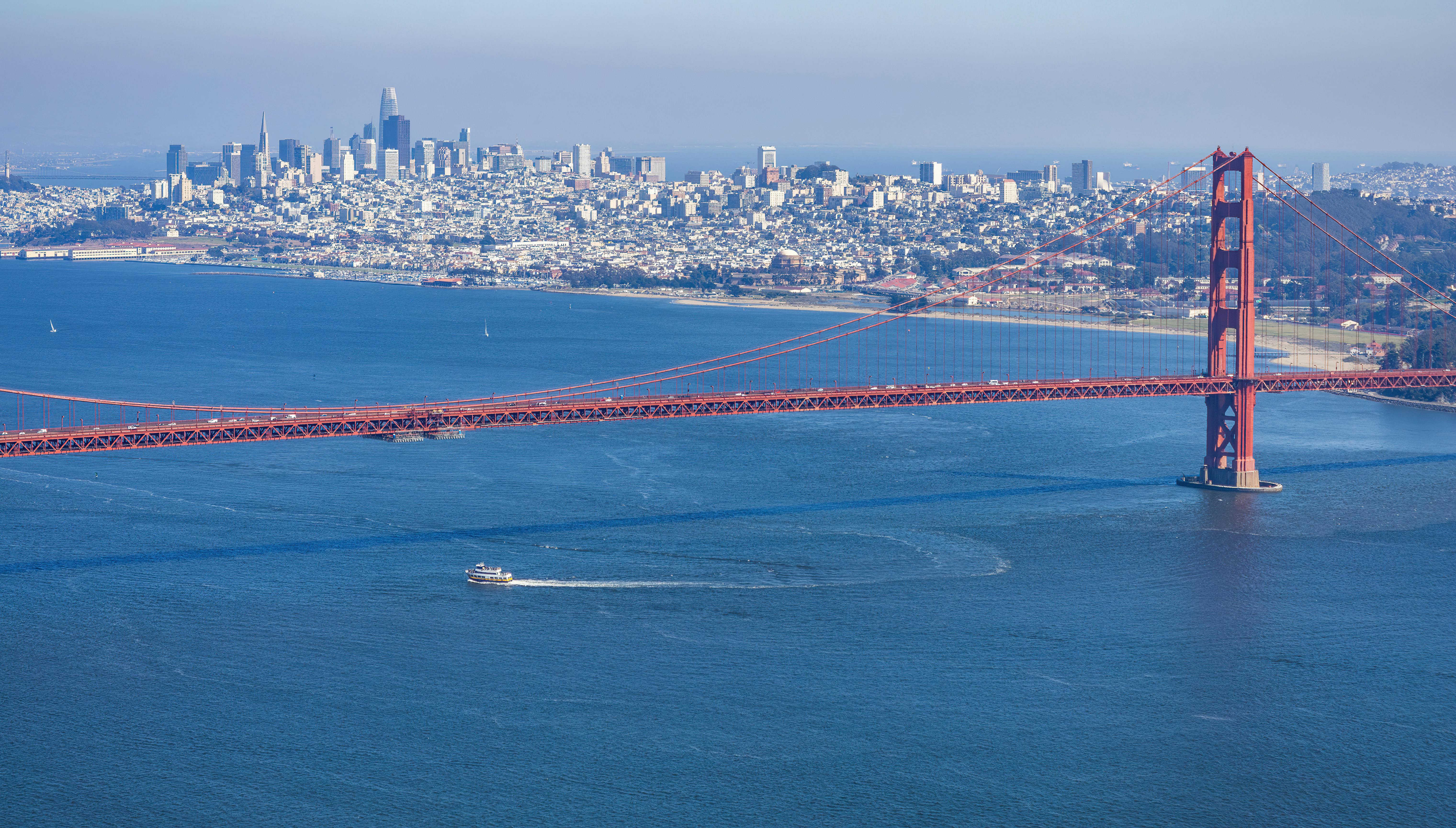 Aerial View of Boat Sailing under Golden Gate Bridge · Free Stock Photo