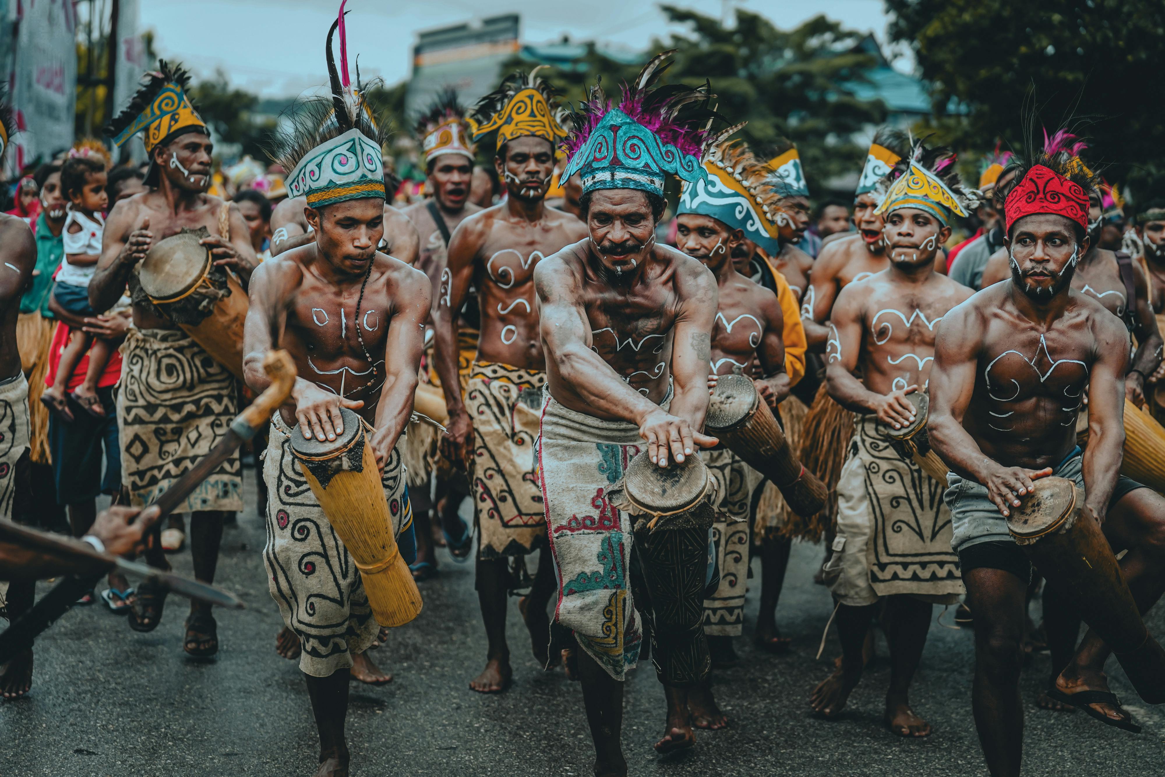 Person in Mask and in Traditional Clothing on Parade · Free Stock Photo