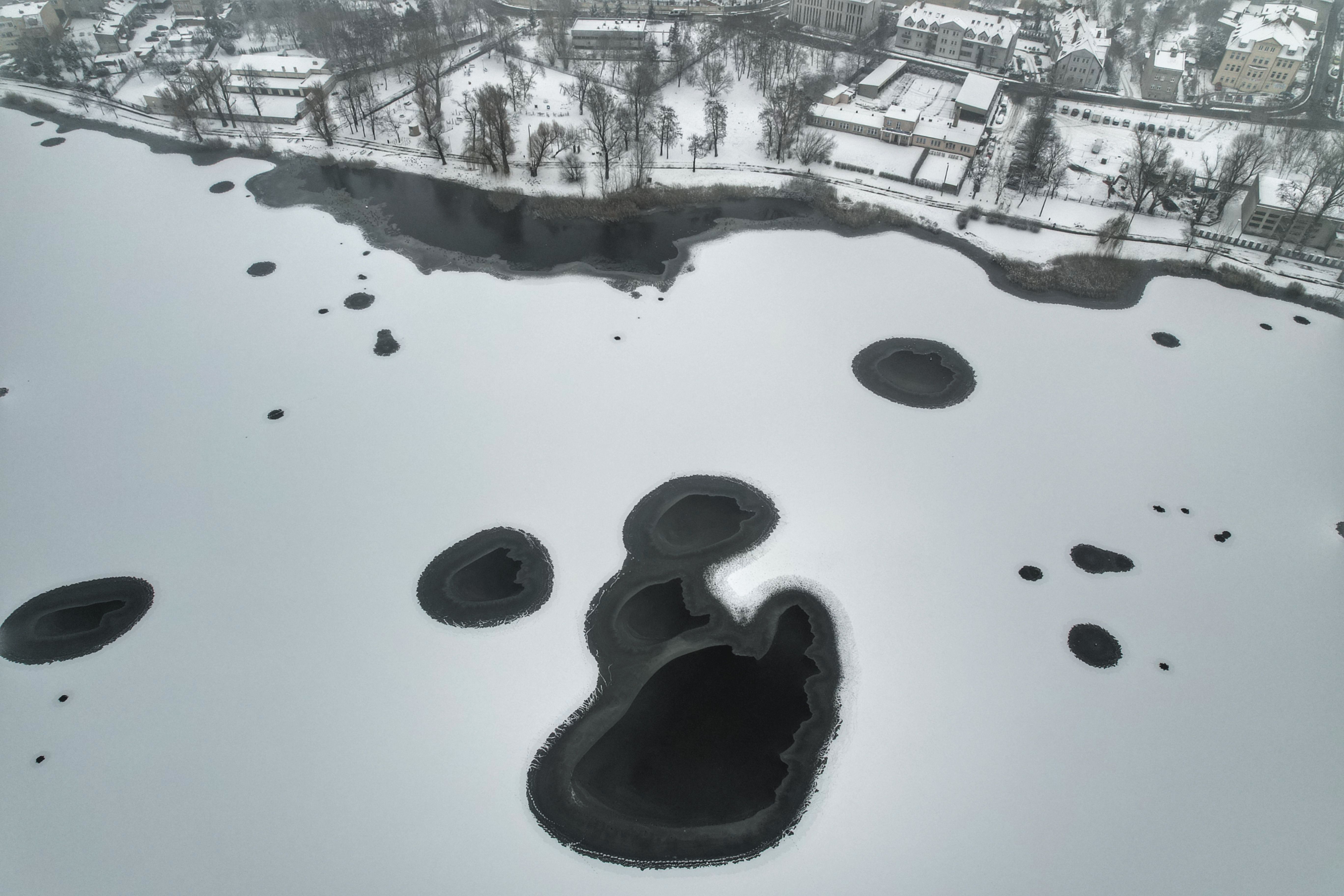 Aerial View of a Frozen River in a City · Free Stock Photo