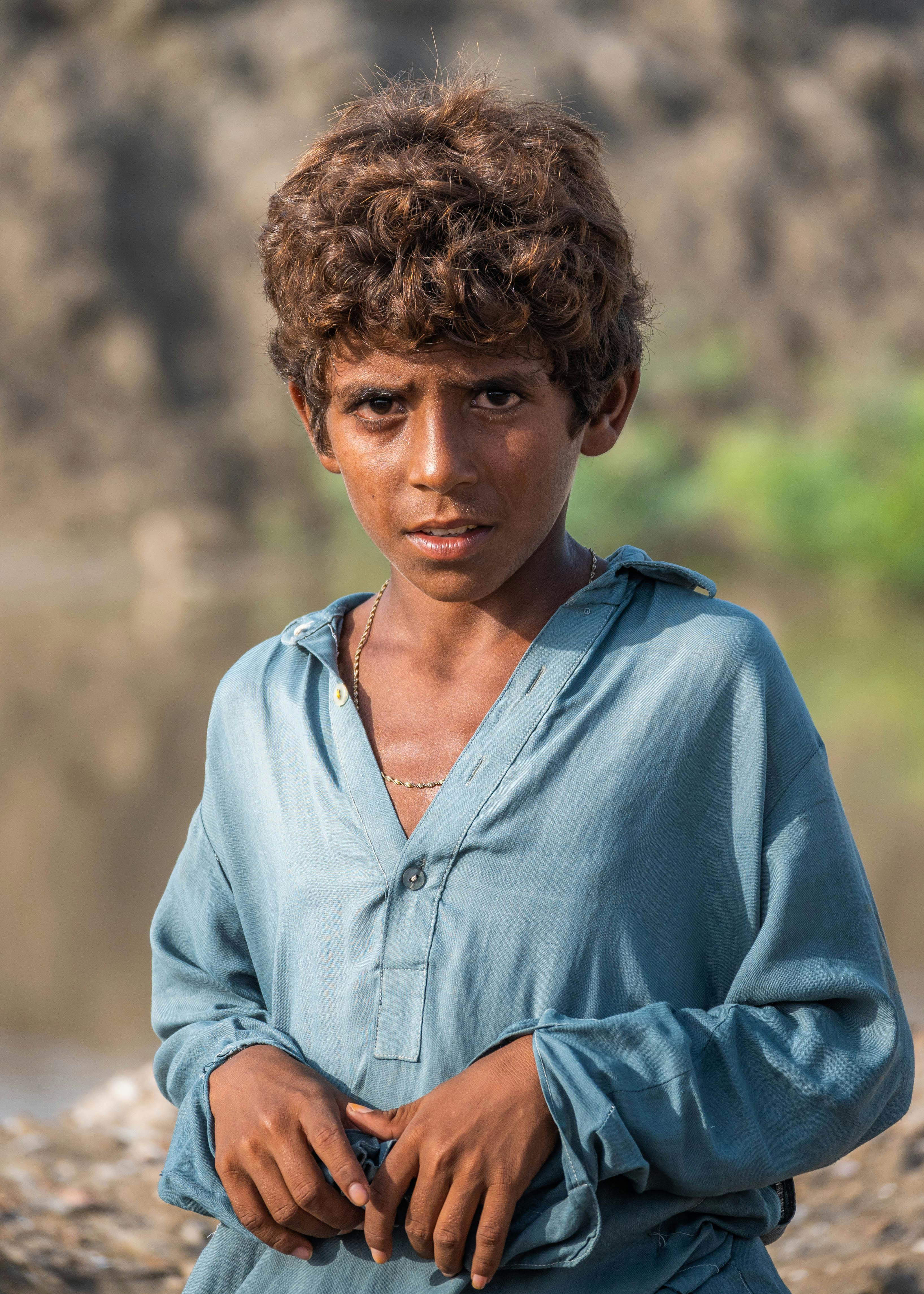 Boy in Blue Long Sleeve Shirt · Free Stock Photo