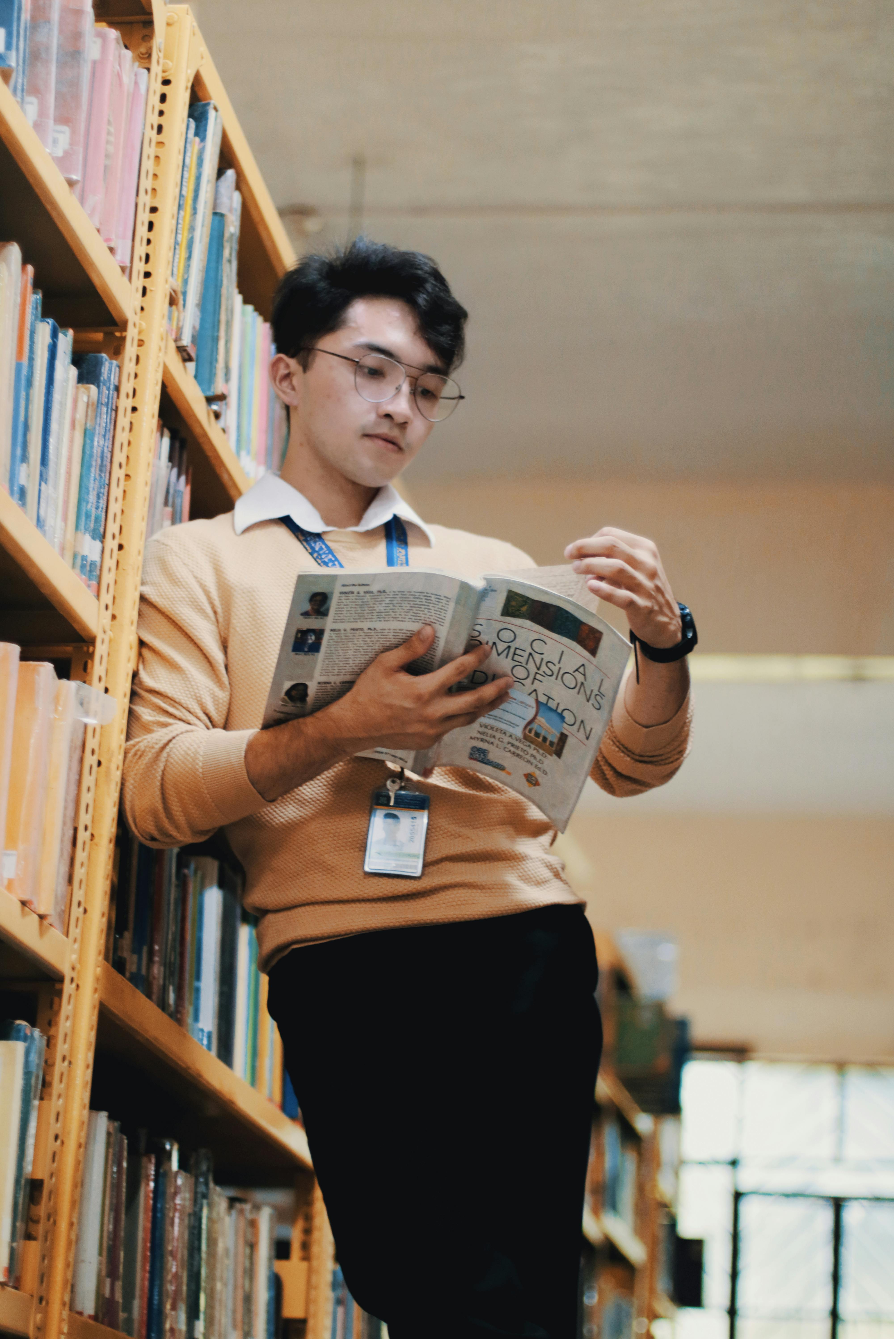 A Man Reading a Book · Free Stock Photo