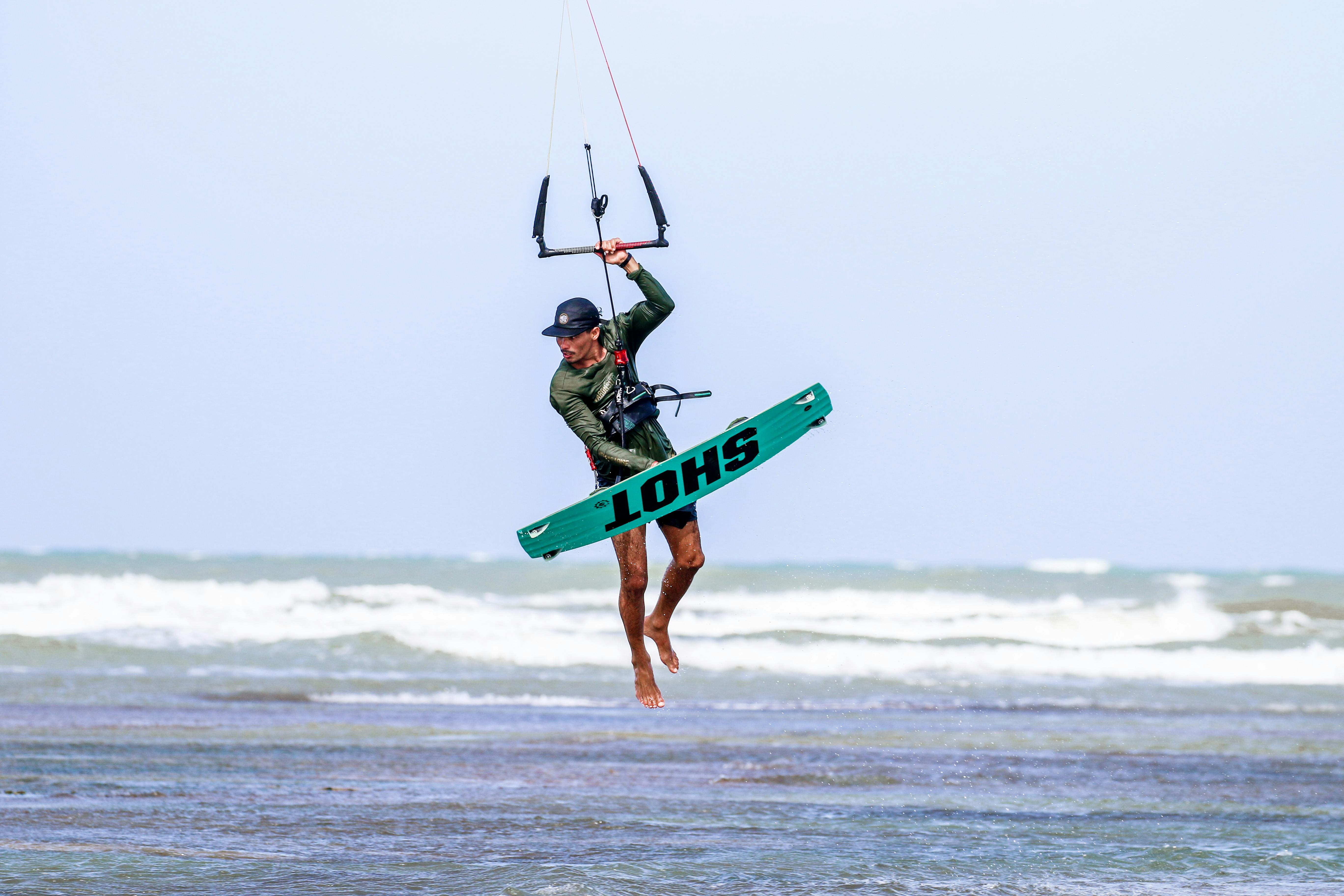 A Man in Black and Blue Wetsuit · Free Stock Photo