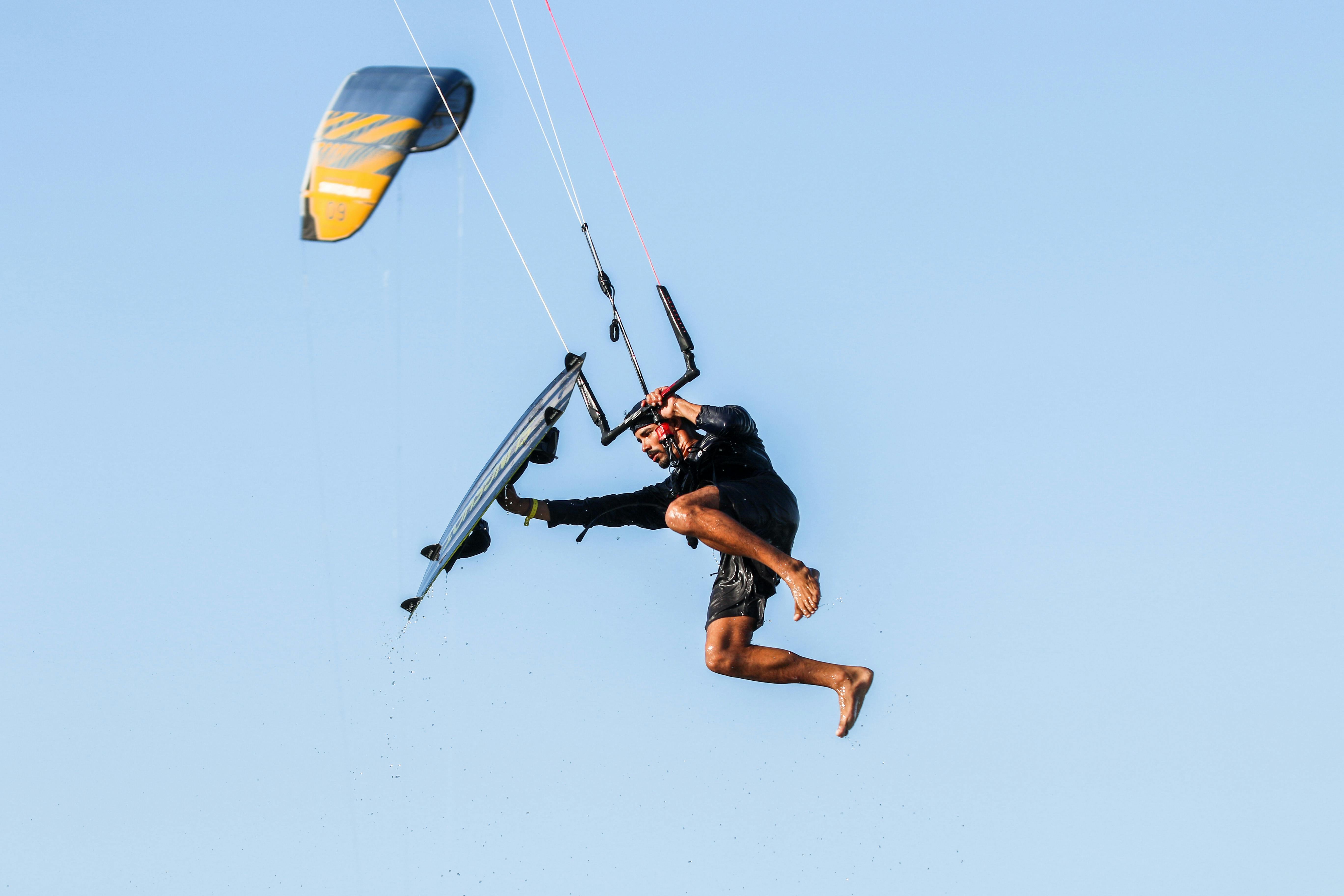 Photo of Kiteboarder in Mid Air · Free Stock Photo