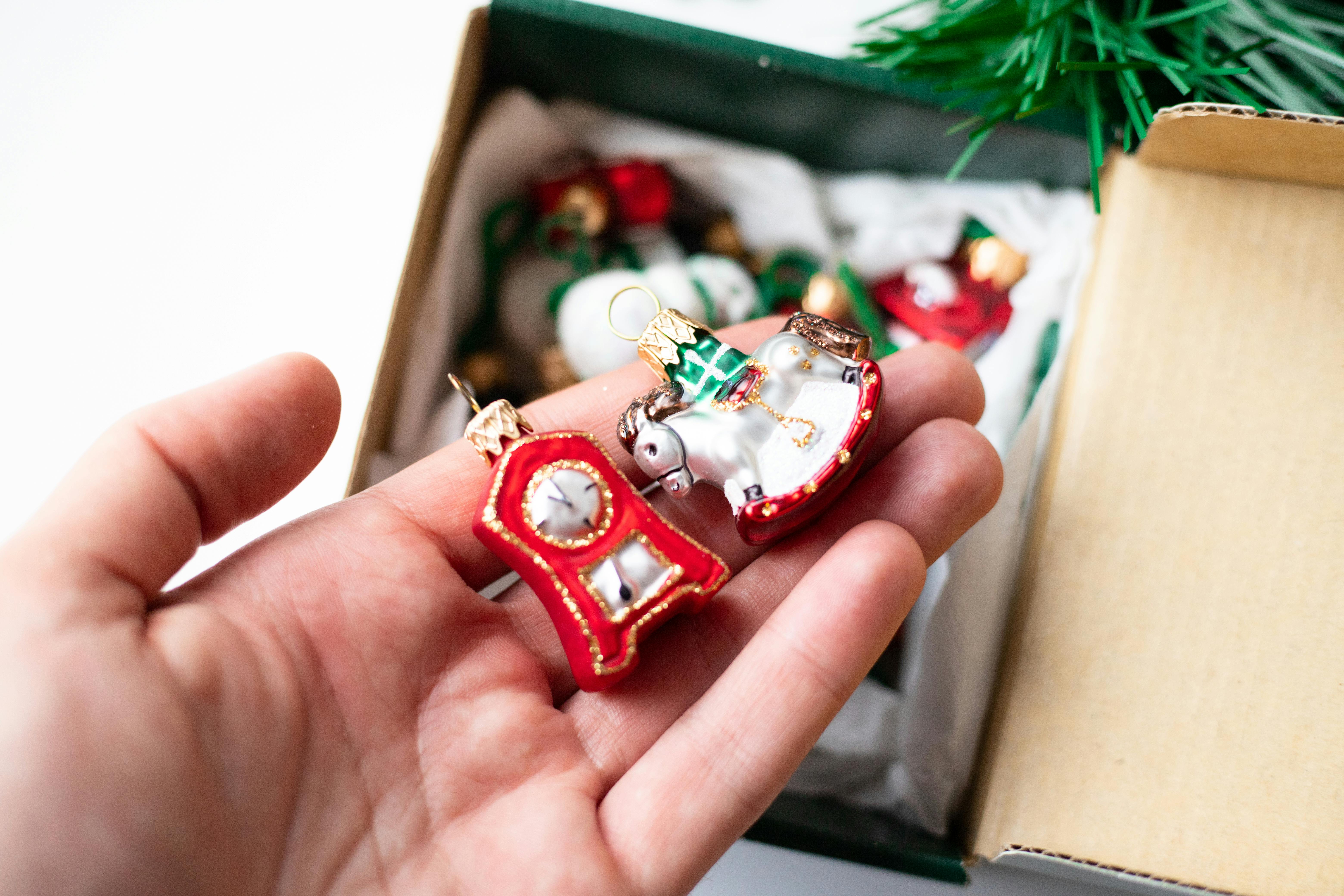 A Person Holding Christmas Decoration · Free Stock Photo